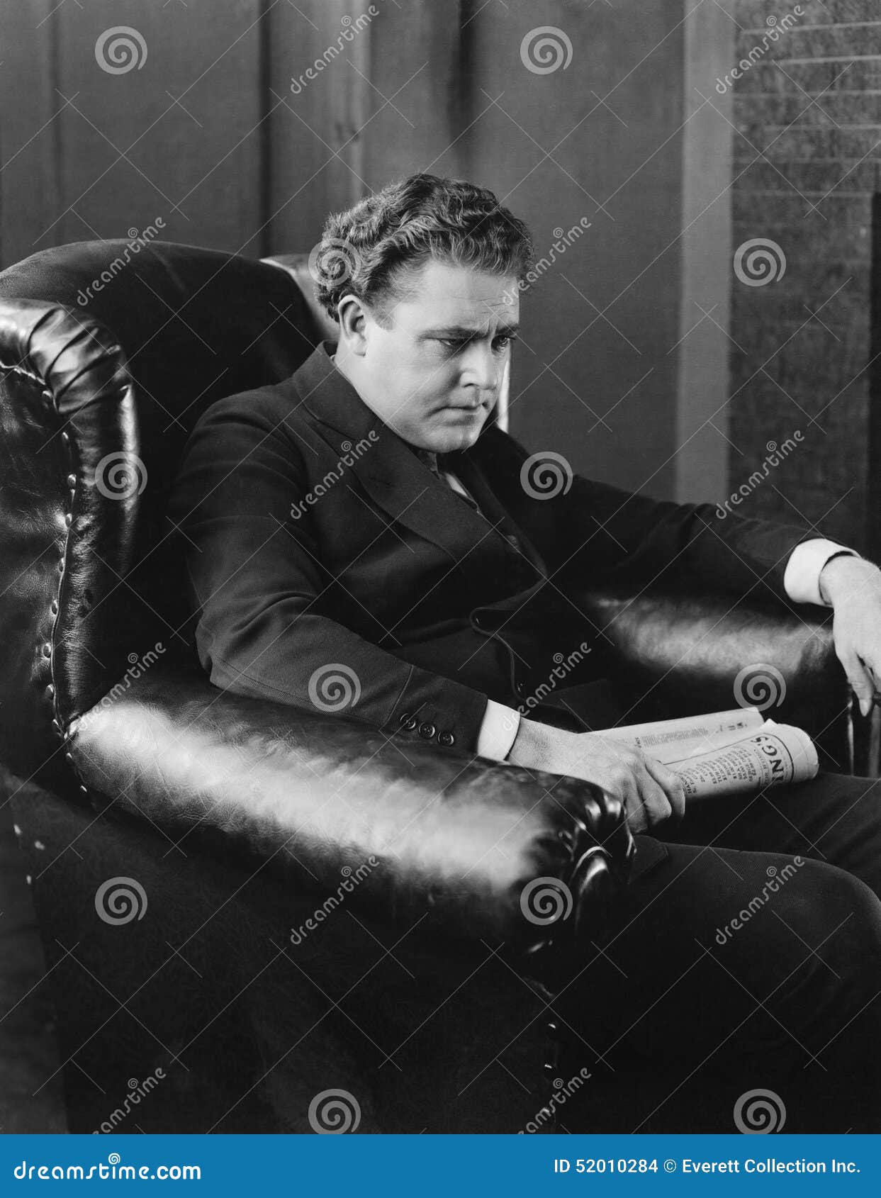 Portrait of Brooding Man in Easy Chair Stock Photo - Image of ...