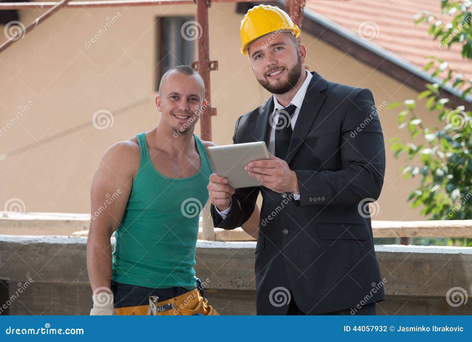Portrait of Builder and Businessman Working at Construction Stock Photo ...