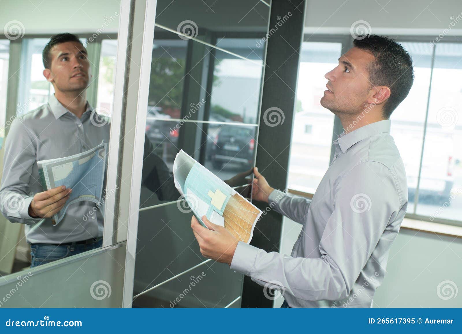 Checking The Tiles In The Bathroom. Quality Control When Laying Ceramic ...