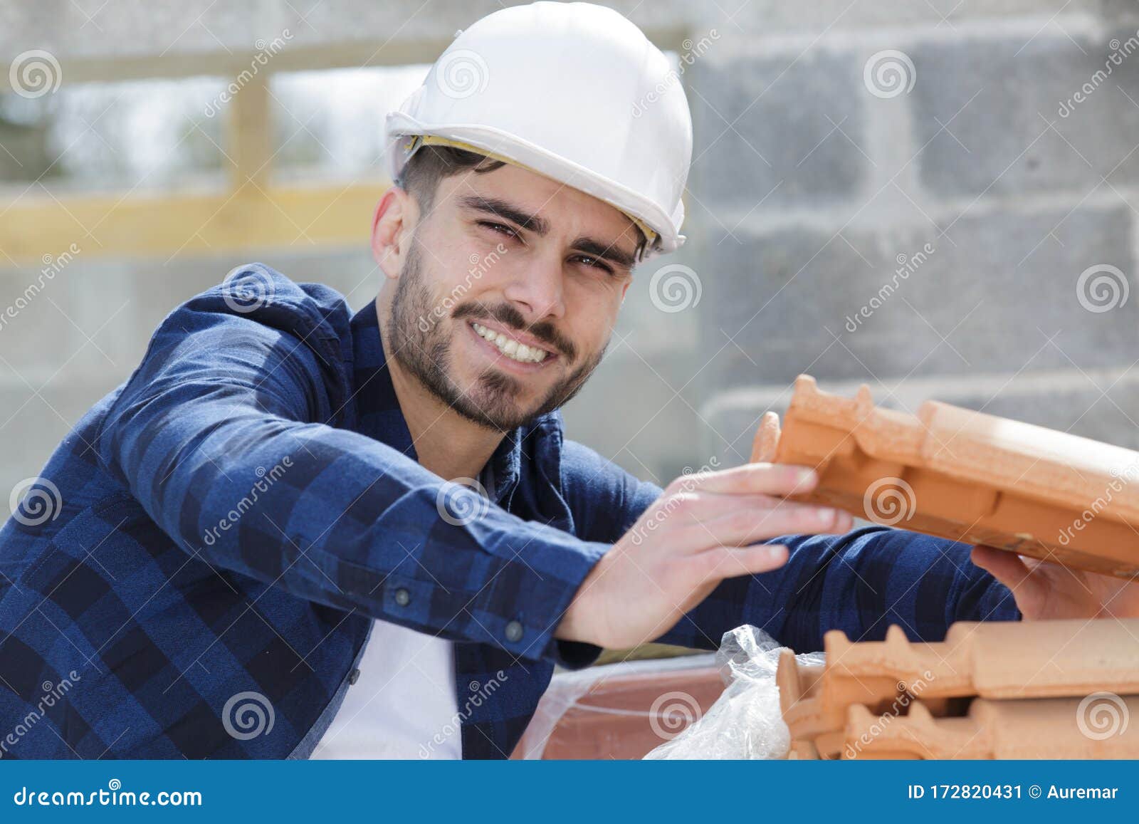 Portrait Builder Lifting Roof Tiles Stock Image - Image of labor ...