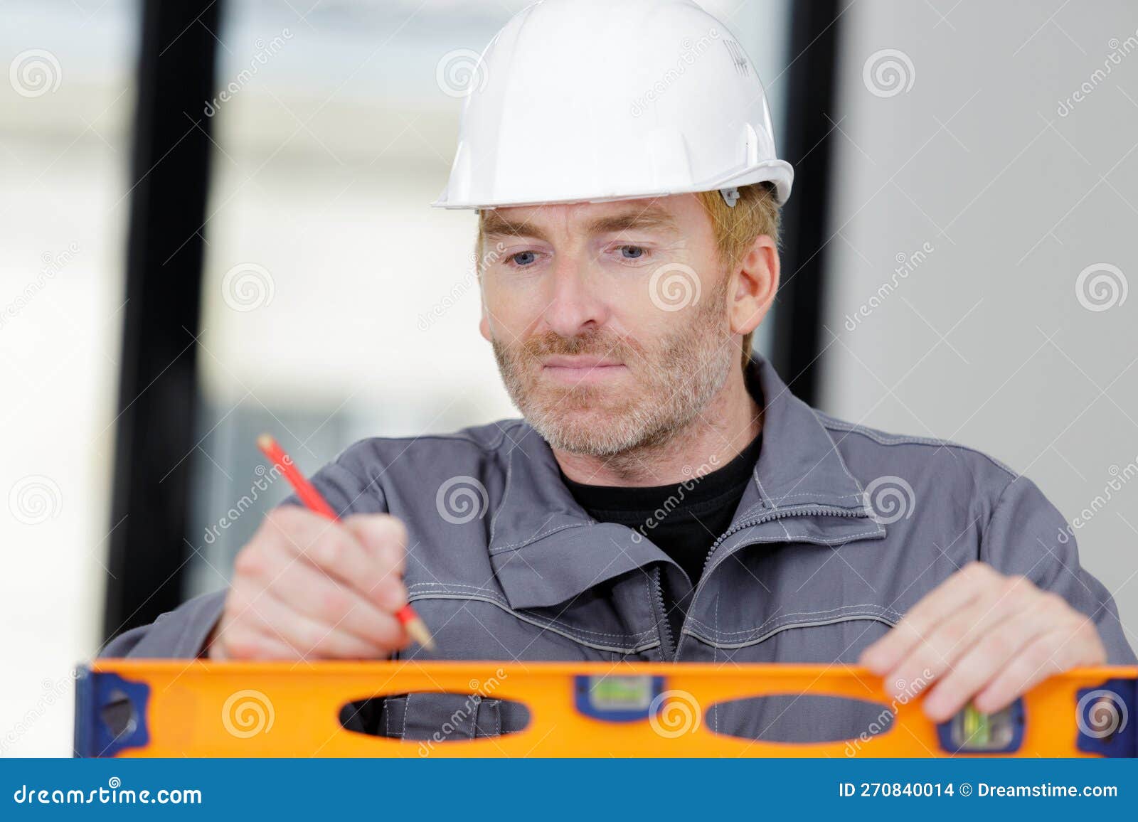 Portrait Builder Man with Spirit Level Stock Photo - Image of male ...