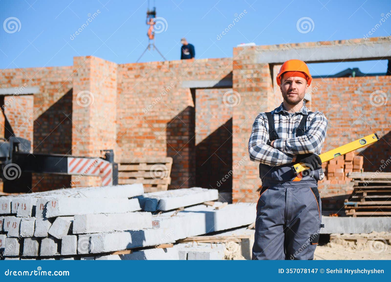 Portrait of a Builder in the Process of Working on a Construction Site ...