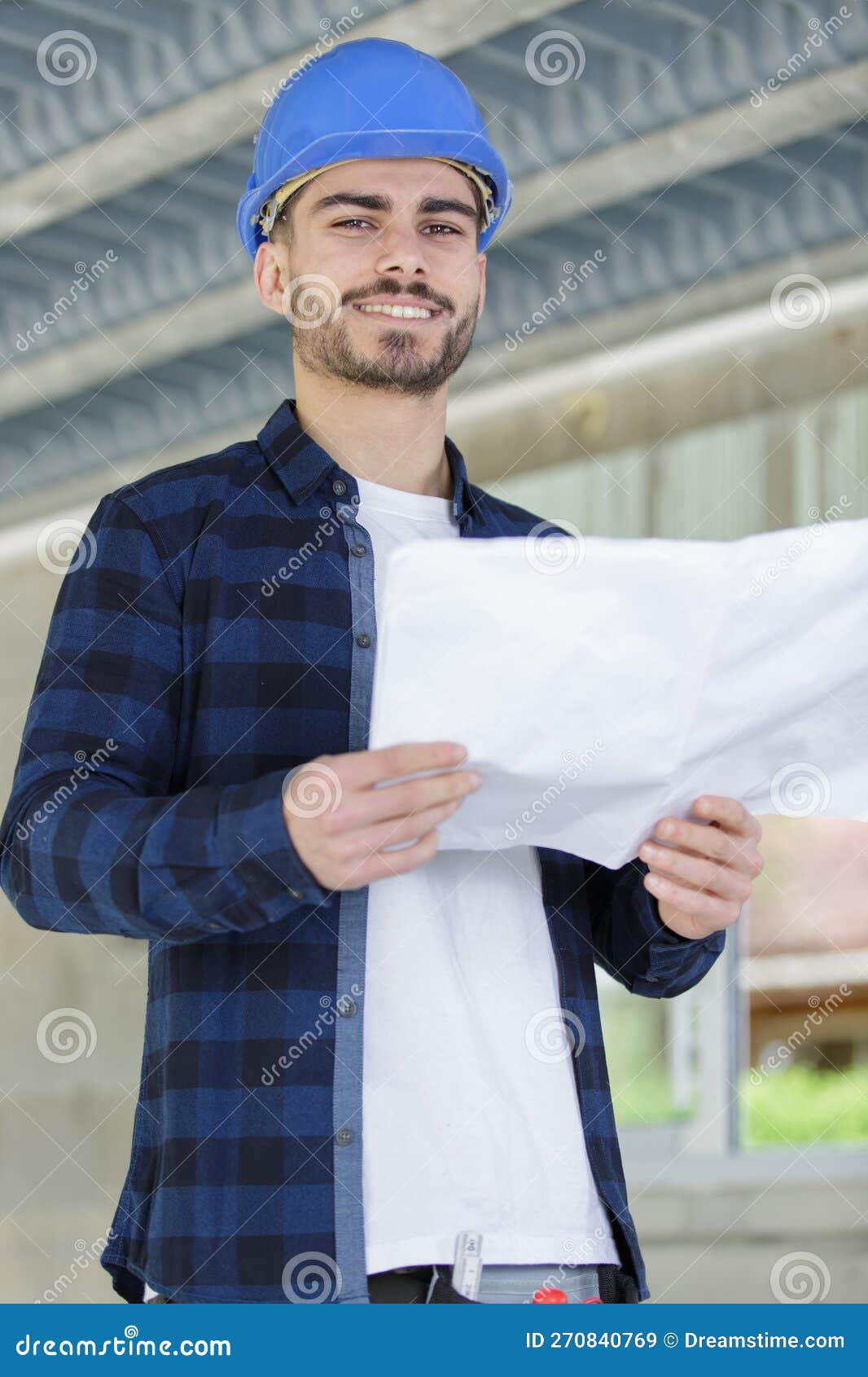 Portrait Of Builder In A Helmet On City Background Royalty-Free Stock ...