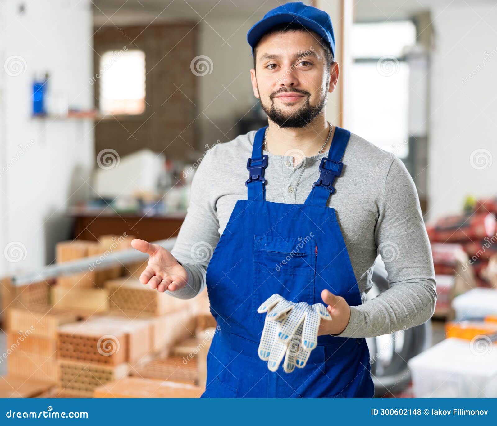 Portrait of a Builder Standing on a Construction Site Indoors Stock ...