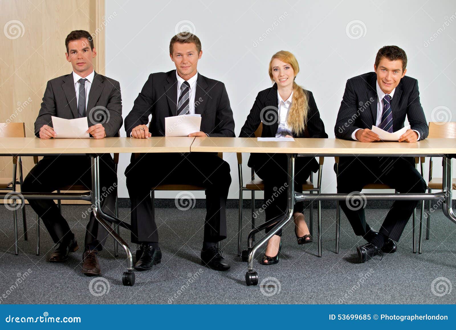 Portrait of Business People Sitting in Office Stock Image - Image of ...