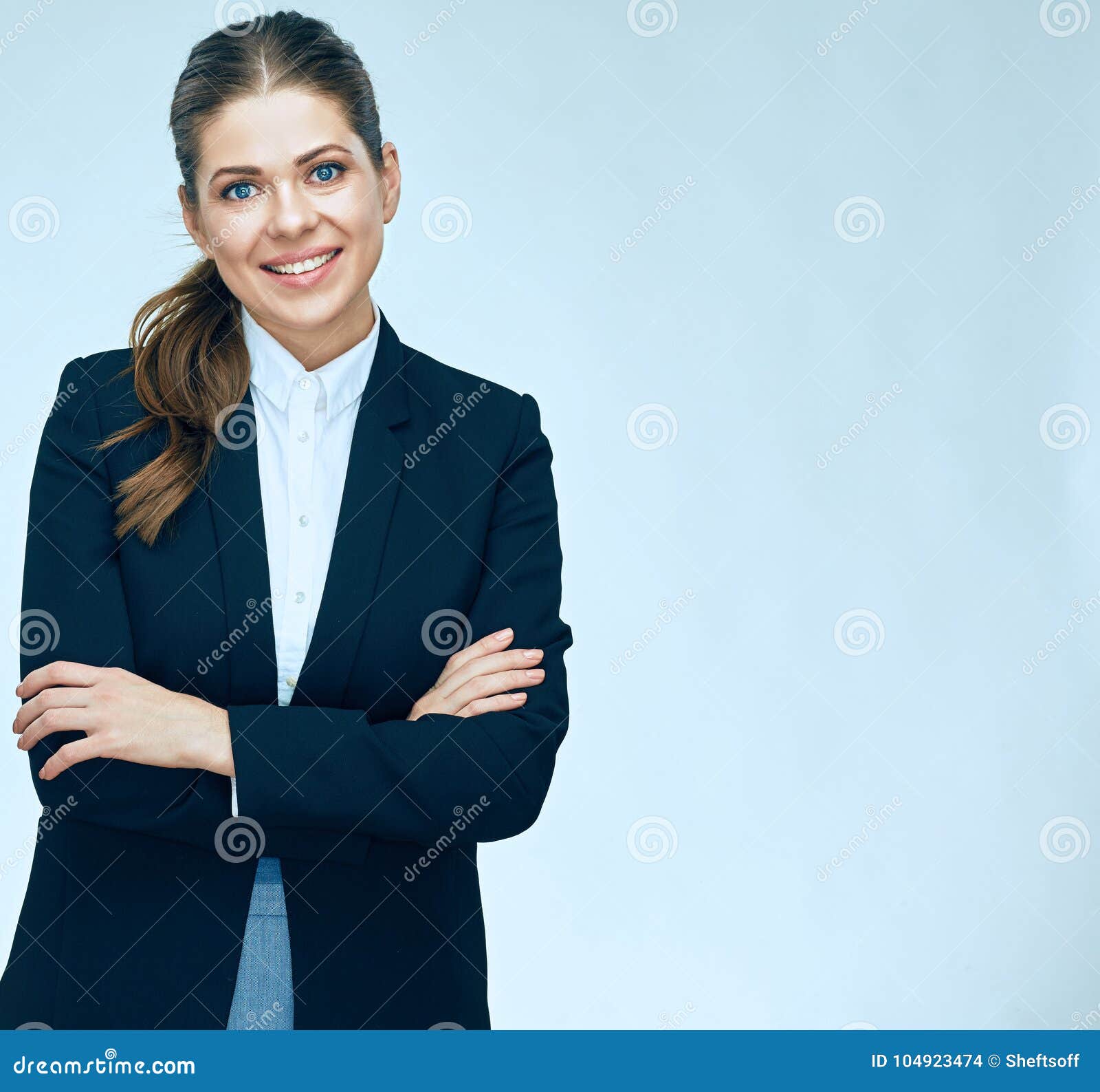 Portrait Of Business Woman Standing Against White Background Stock