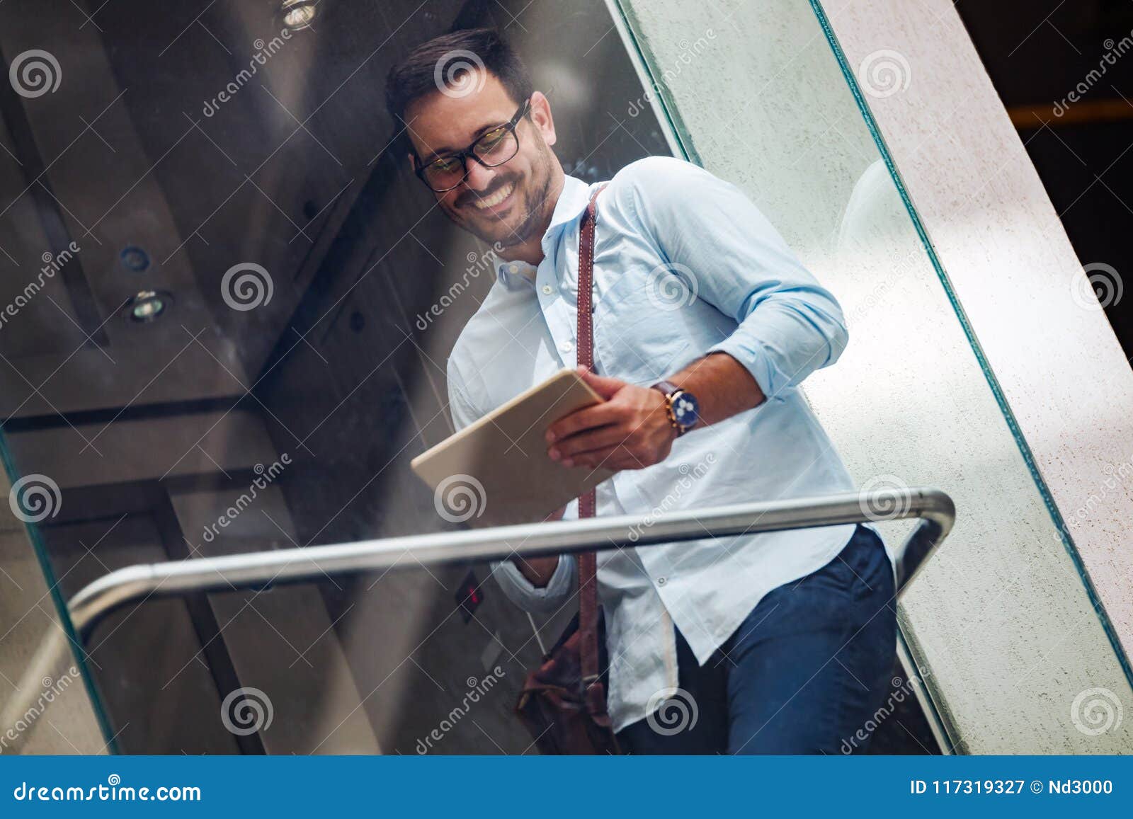 Portrait Of Businessman In Glasses Holding Tablet Stock Image Image