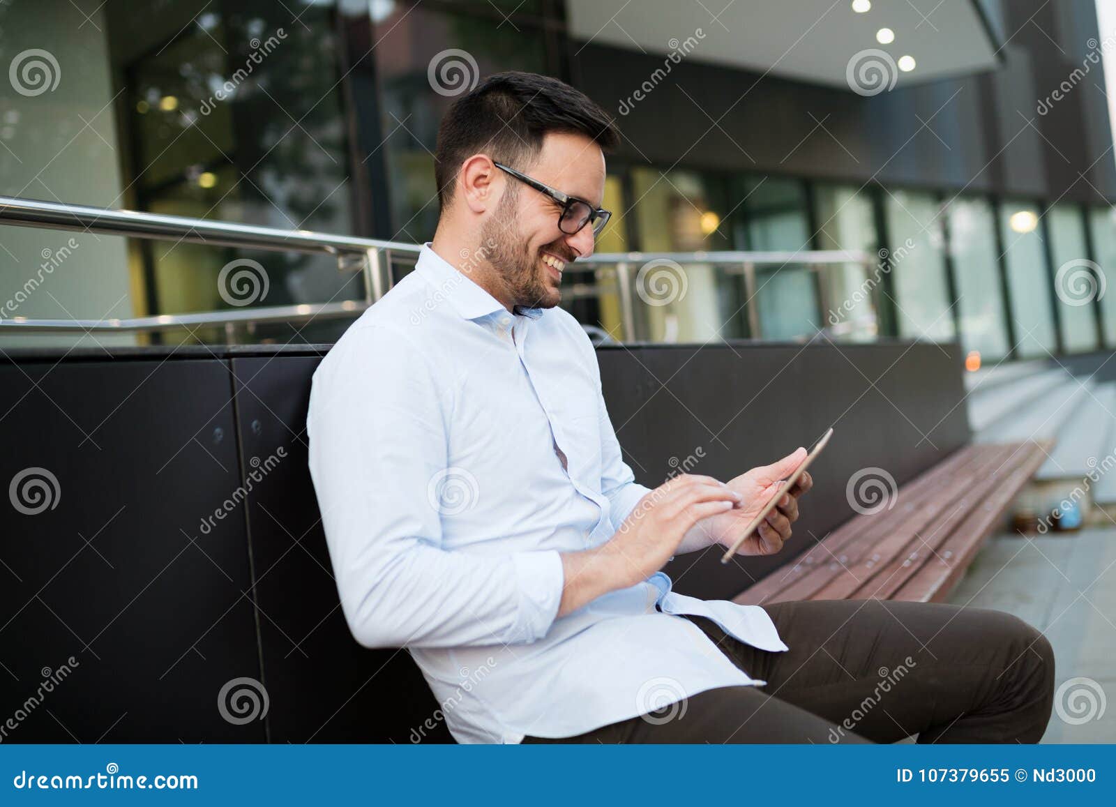 Portrait Of Businessman In Glasses Holding Tablet Stock Image Image