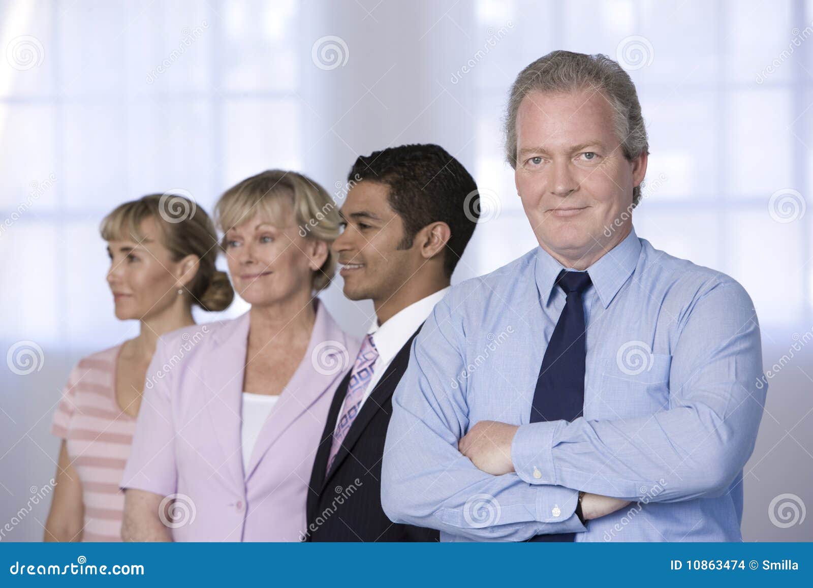 Portrait of a Businessman and His Team. Stock Photo - Image of ...