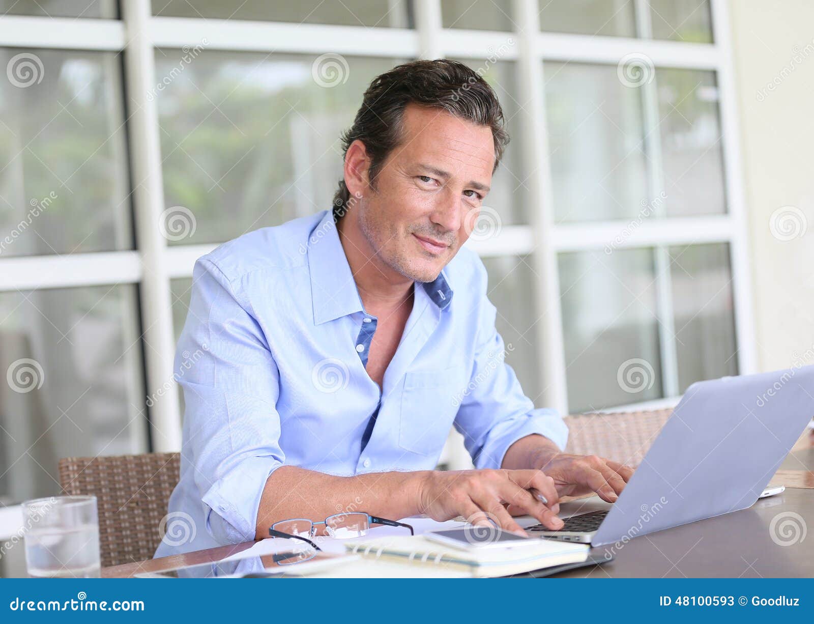 Portrait of a Businessman Teleworking Stock Image - Image of table ...