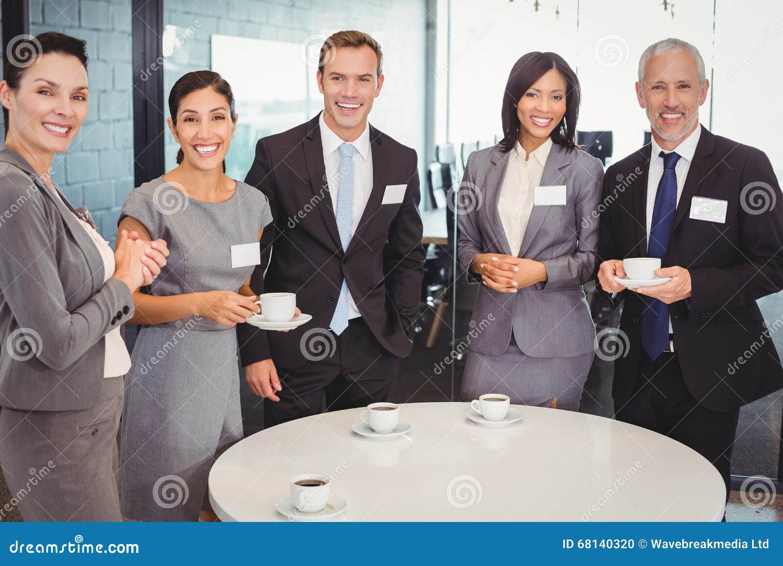 Portrait of Businesspeople Having Tea during Breaktime Stock Photo ...
