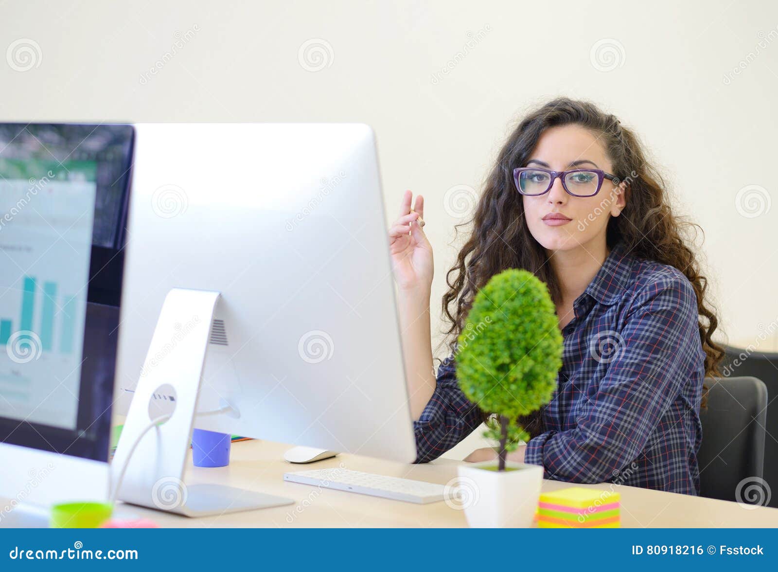 Portrait of Businesswoman with Computer Writes on a Document at Her ...