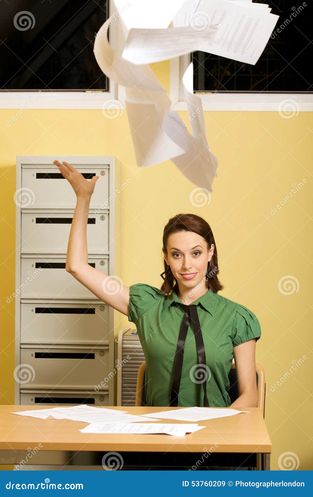 Portrait of Businesswoman Throwing Document at Office Stock Image ...