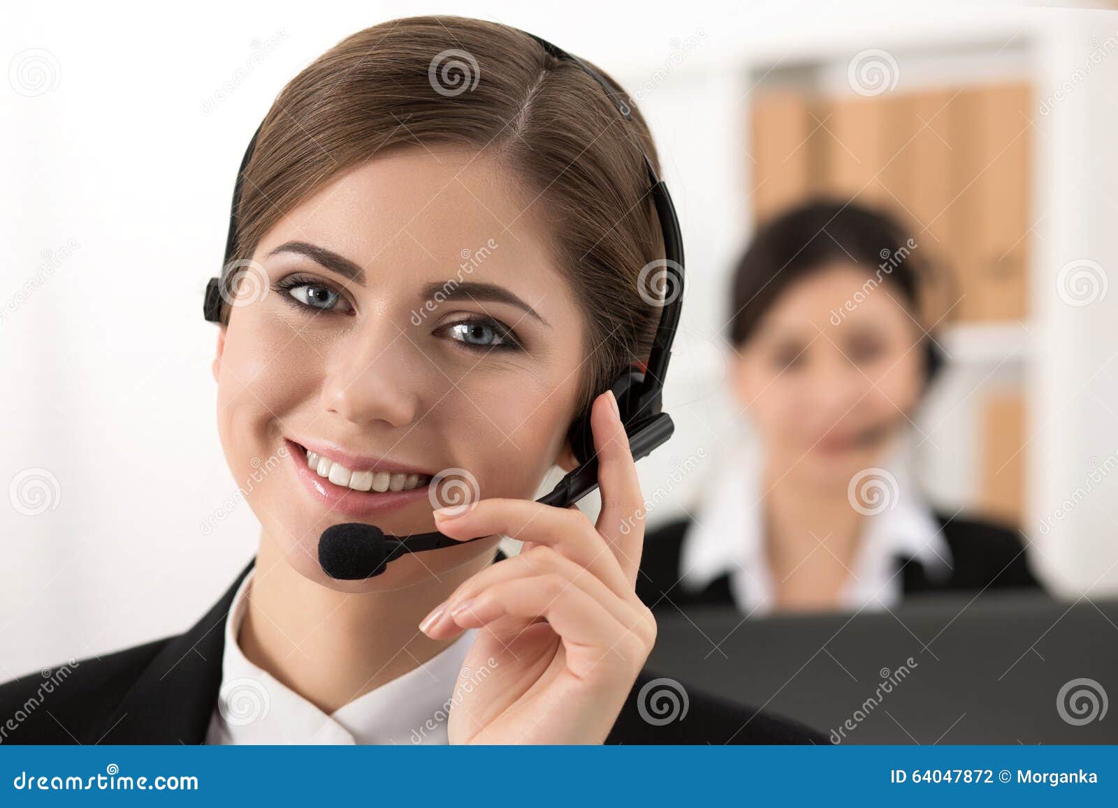 Portrait of Call Center Worker Accompanied by Her Team Stock Photo ...