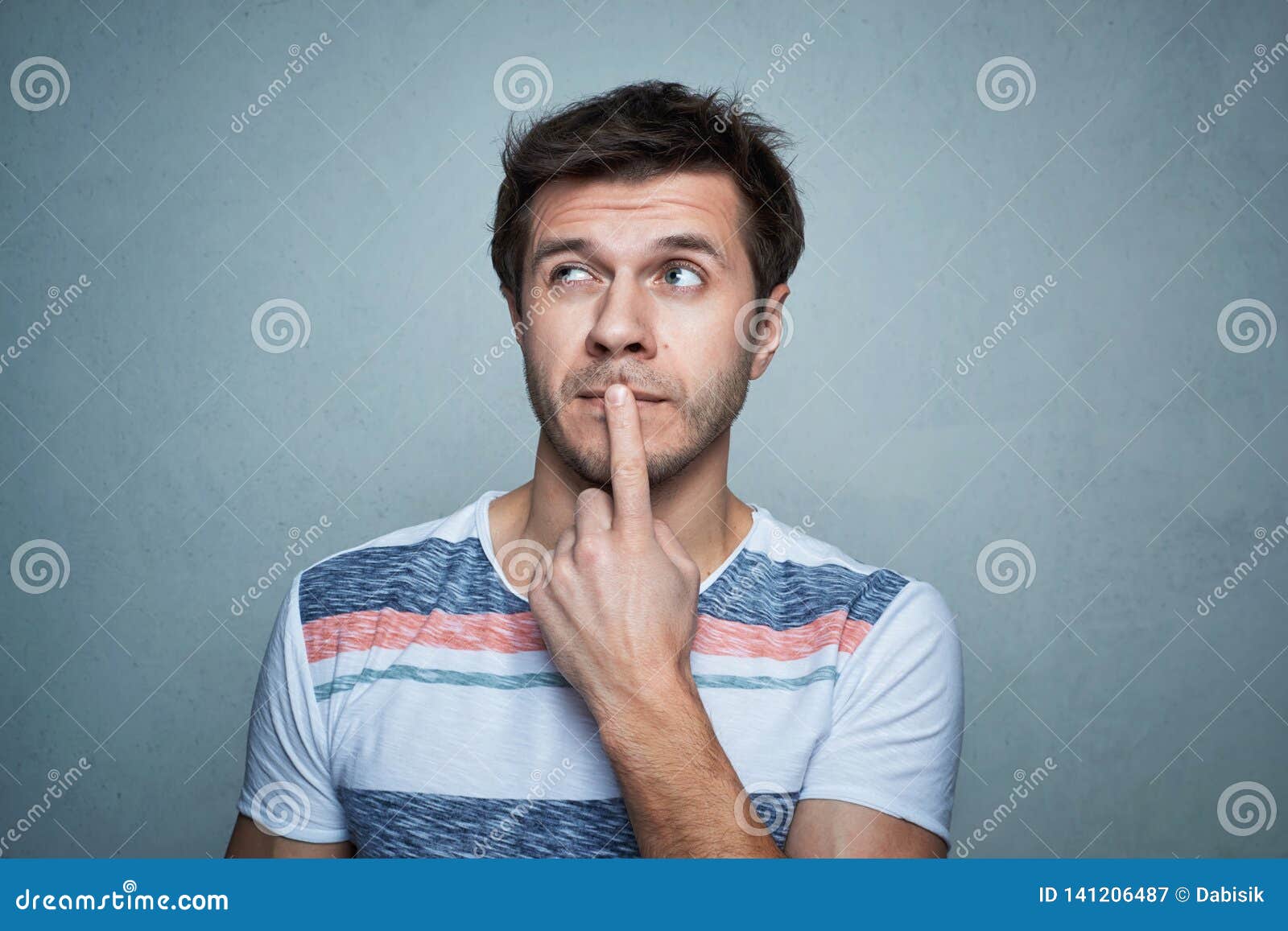 Portrait of Caucasian Man with Think Emotion on a Gray Background Stock ... Portrait of Caucasian Man with Think Emotion on a Gray Background Stock ...
