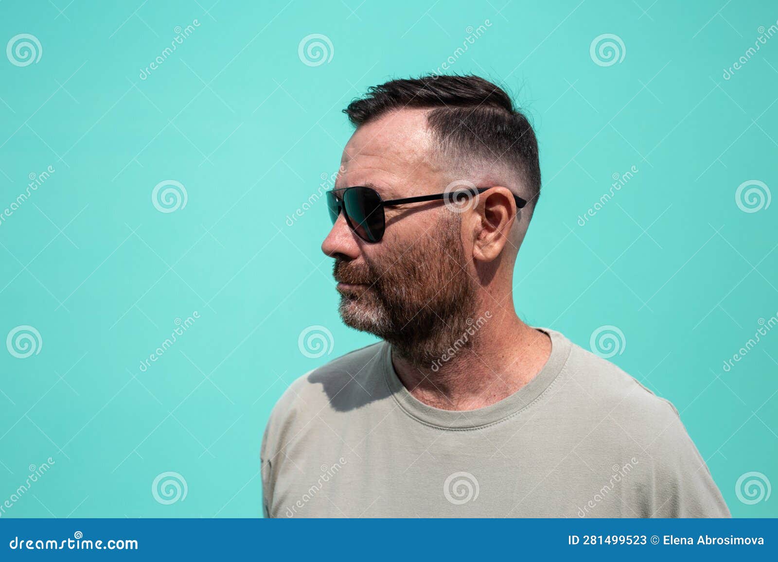Portrait Of Caucasian Man Wearing Sunglasses Fresh Haircut And Raw