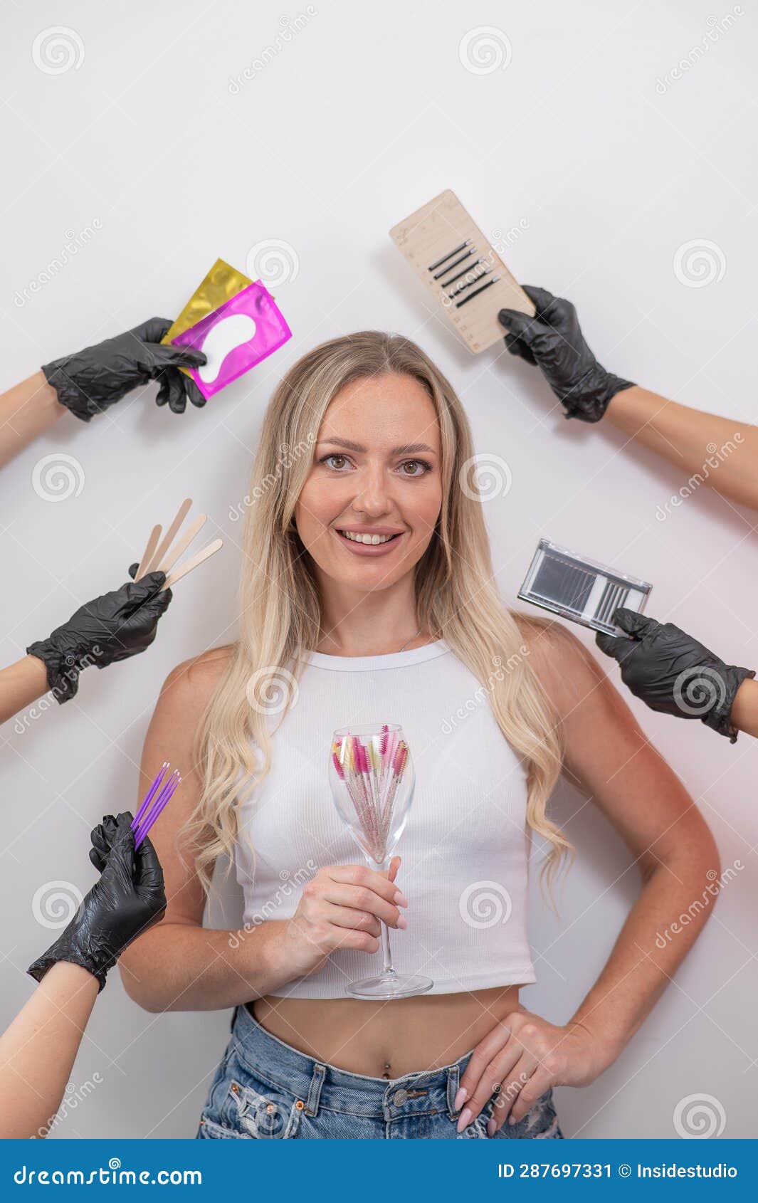 Portrait Of Caucasian Woman And Masters Hands With Eyelash Extension