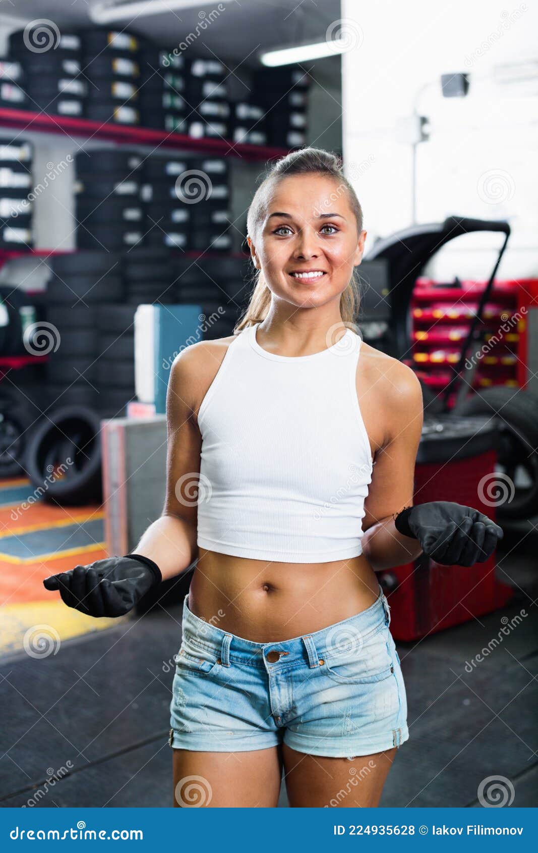 Portrait of Cheerful Girl in Auto Workshop Stock Photo - Image of ...