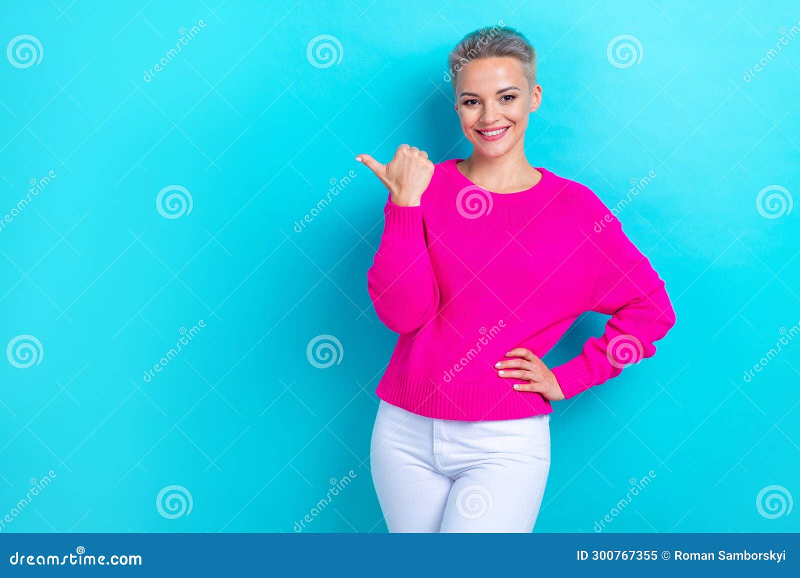 Portrait Of Cheerful Girl With Dyed Hairdo Wear Knit Sweater Indicating