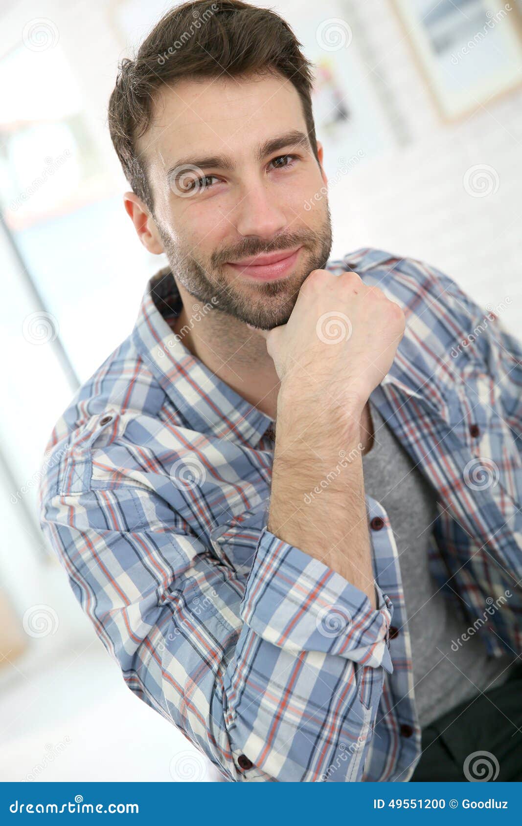 Portrait of a Cheerful Man Sitting at Home Stock Photo - Image of ...
