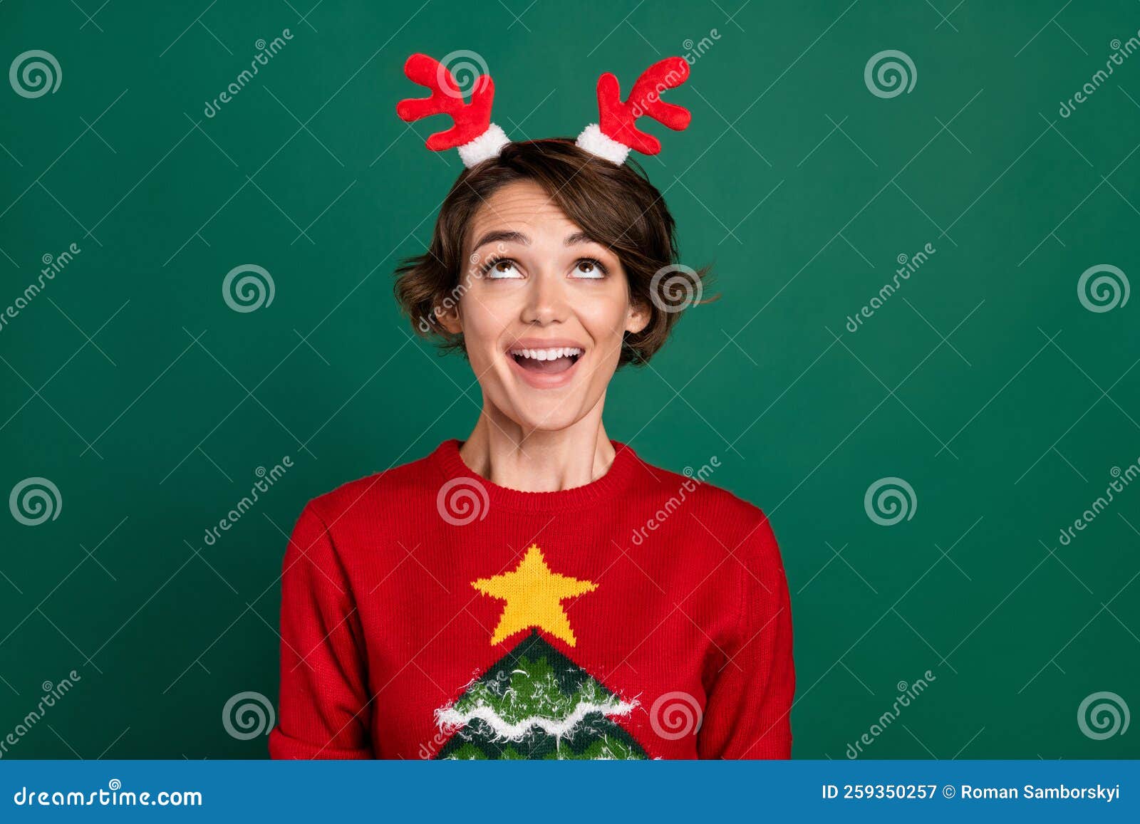 Portrait Of Cheerful Positive Lady Toothy Smile Look Up Deer Antlers