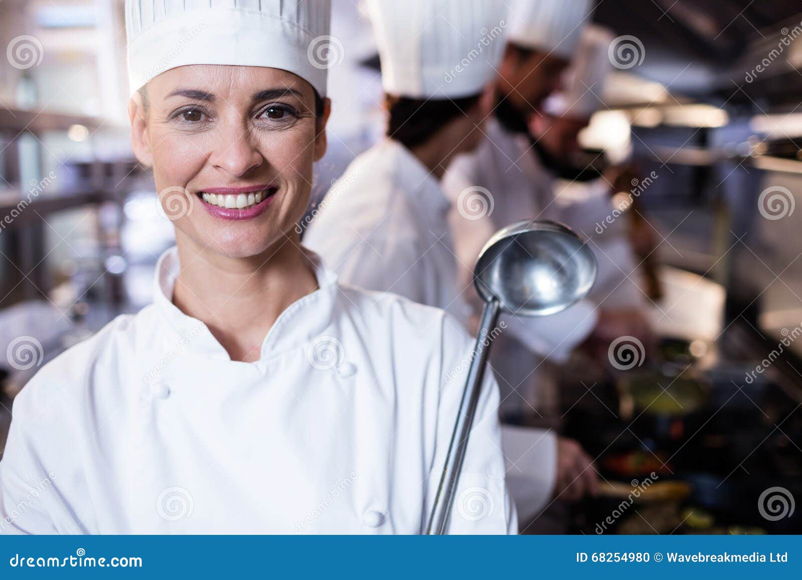 Portrait of Chef Holding a Ladle Stock Photo - Image of ladle, indoors ...