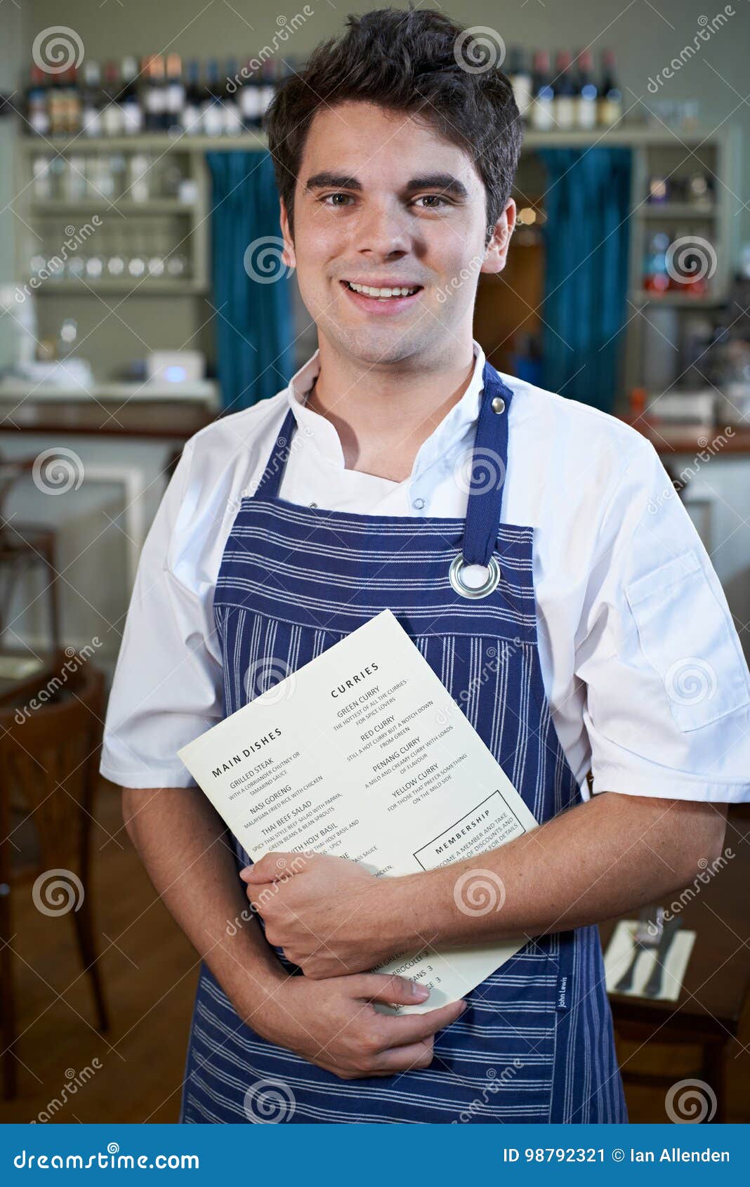 Portrait of Chef Standing in Restaurant Holding Menu Stock Image ...