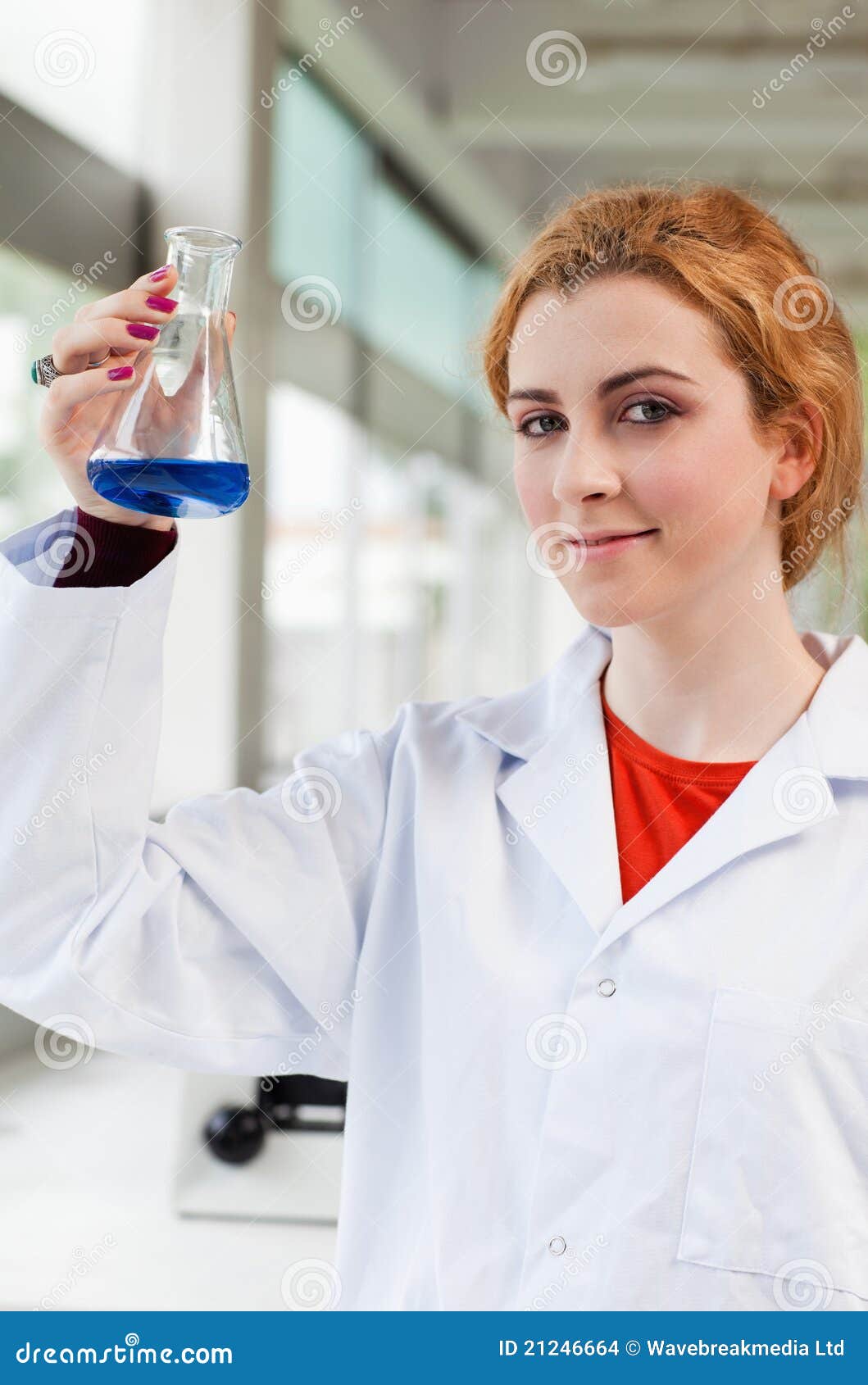 Portrait of a Chemist Holding a Blue Liquid Stock Photo - Image of ...