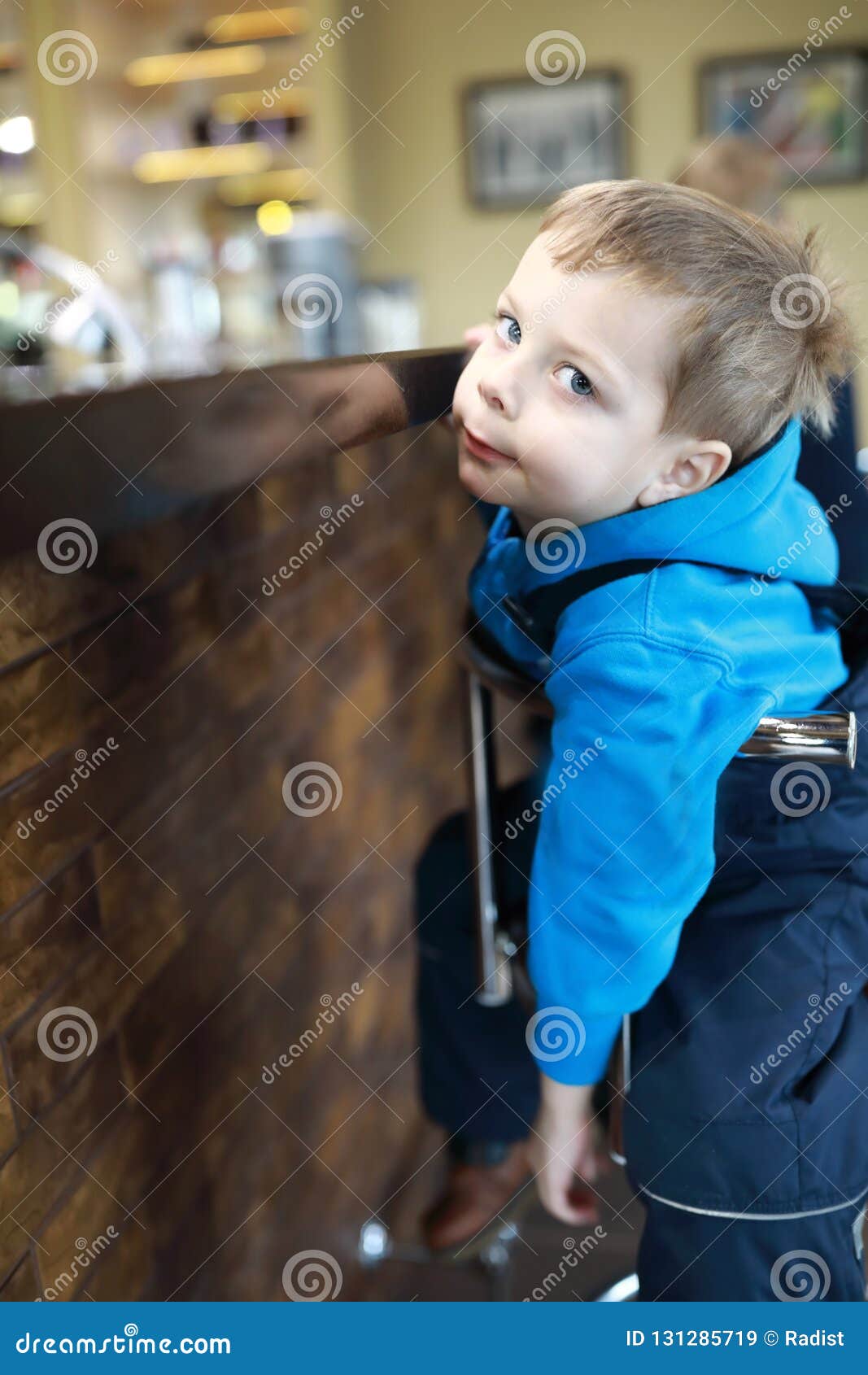 Portrait of child at bar stock image. Image of meal - 131285719
