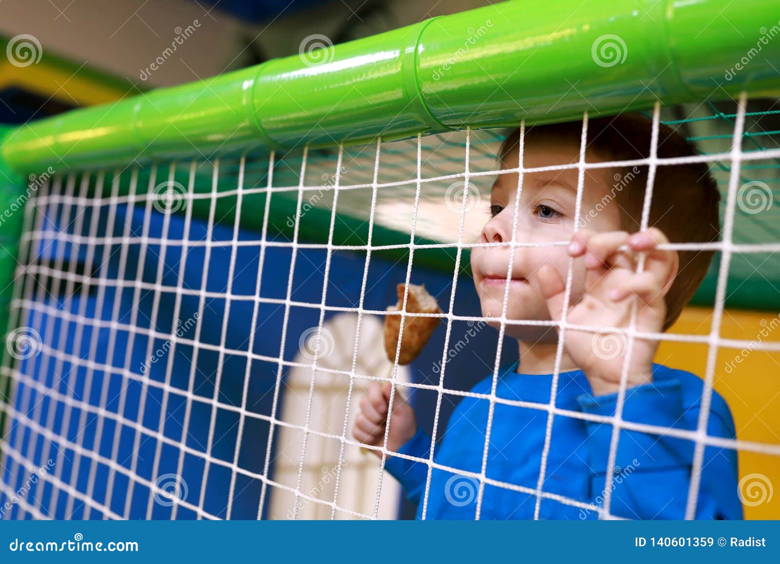 Child behind net stock image. Image of fence, depression - 140601359