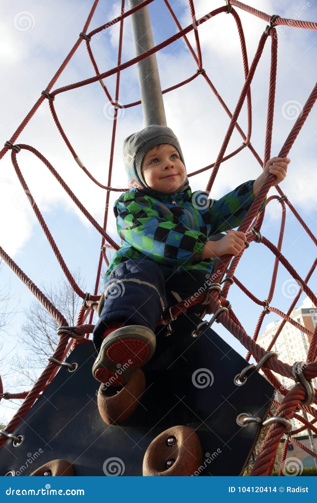 Child on climbing net stock photo. Image of adventure - 104120414