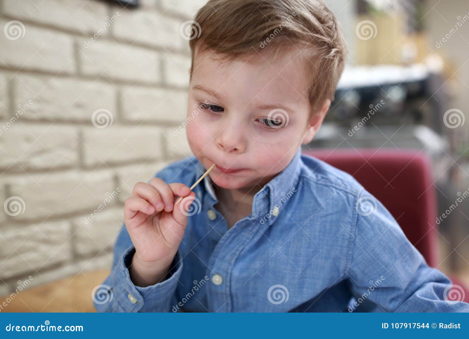 Child with toothpick stock photo. Image of caucasian - 107917544