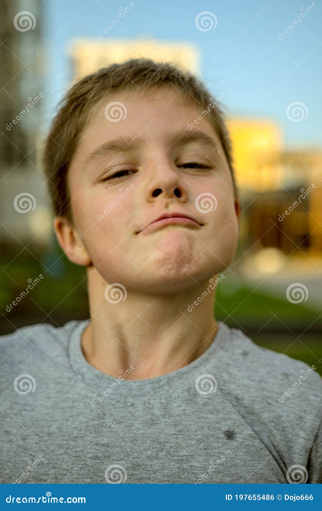 Portrait of a Child Who Squints Slyly Stock Photo - Image of blond ...