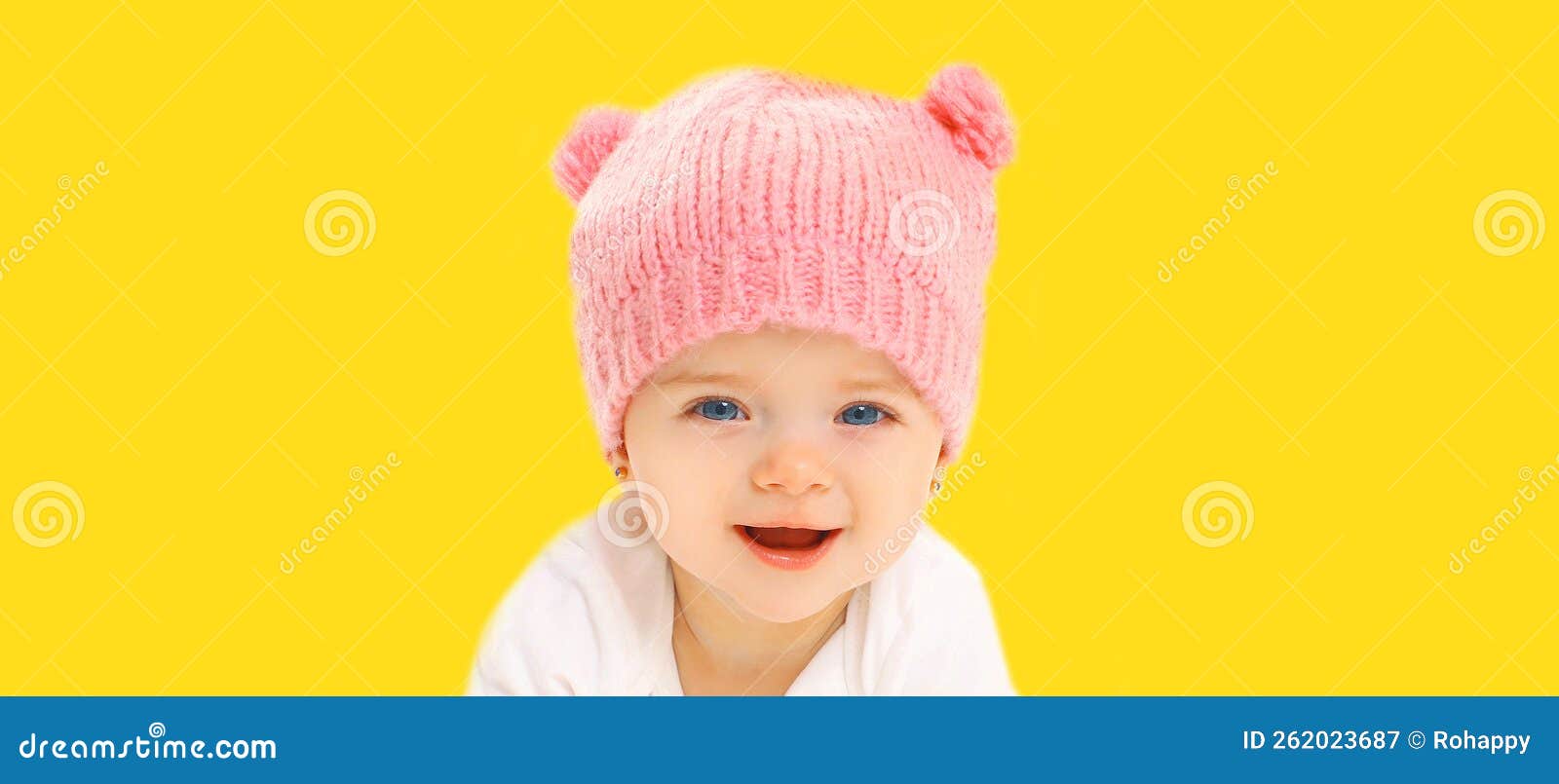 Portrait Close Up of Cute Smiling Baby in Pink Knitted Hat with Bear ... Portrait Close Up of Cute Smiling Baby in Pink Knitted Hat with Bear ...