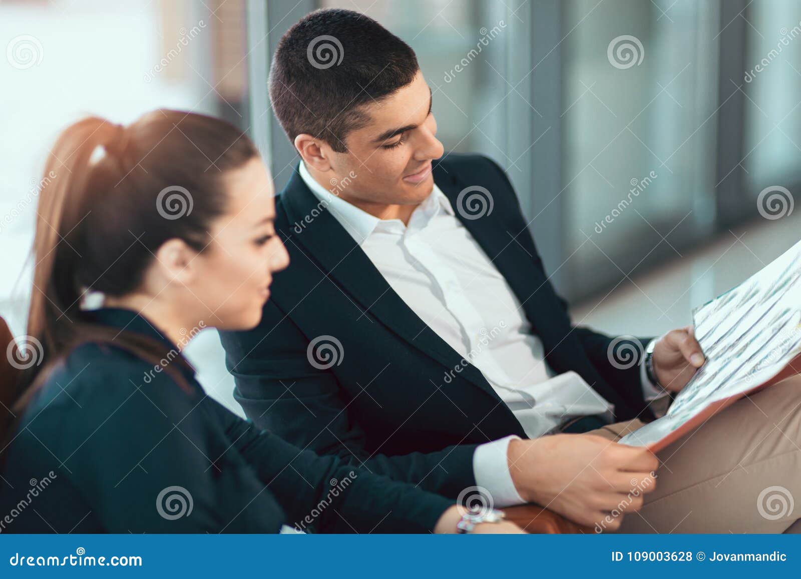 Portrait of Colleagues Looking at Documents Stock Photo - Image of ...