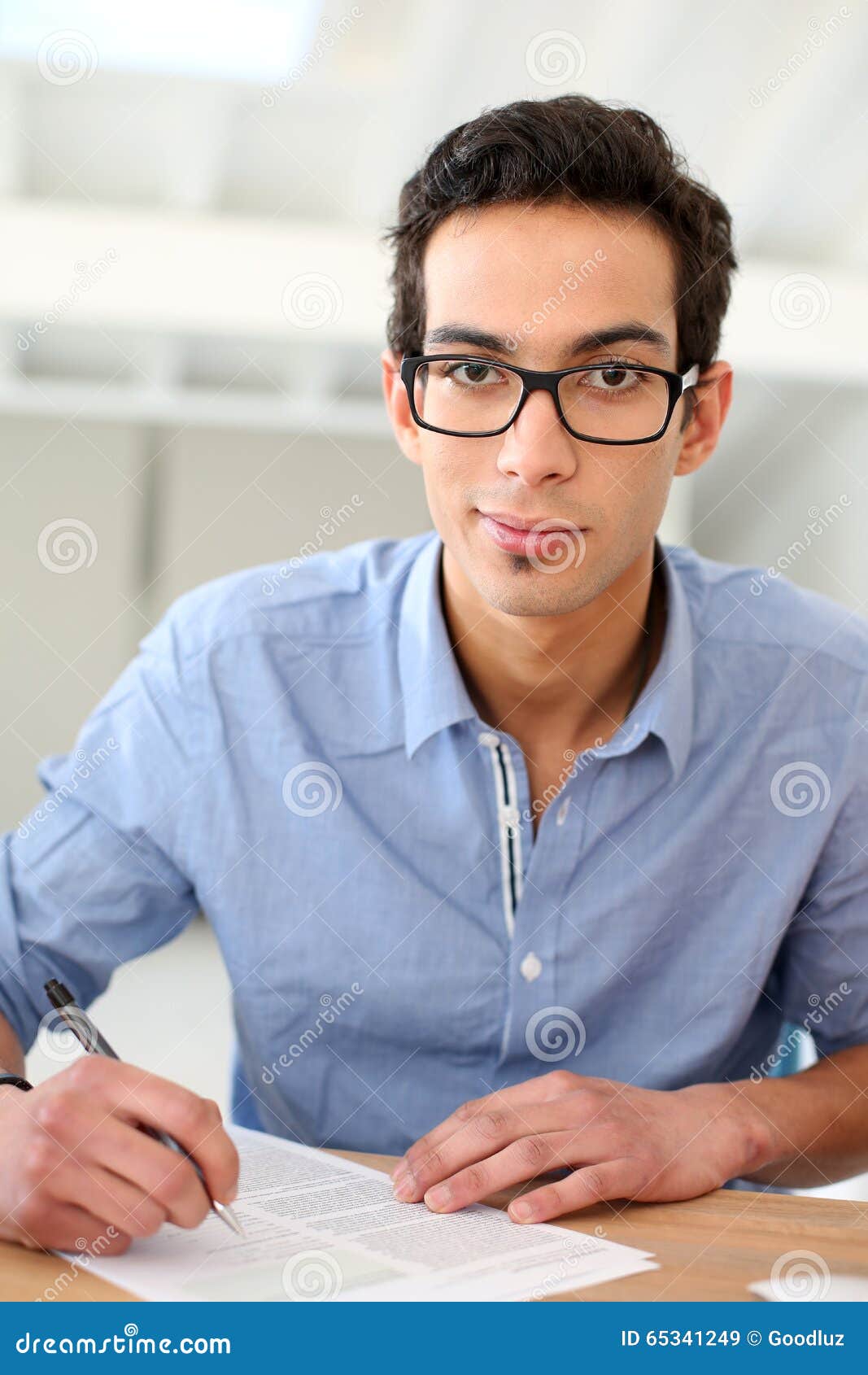 Portrait of College Student in Class Stock Image - Image of sitting ...