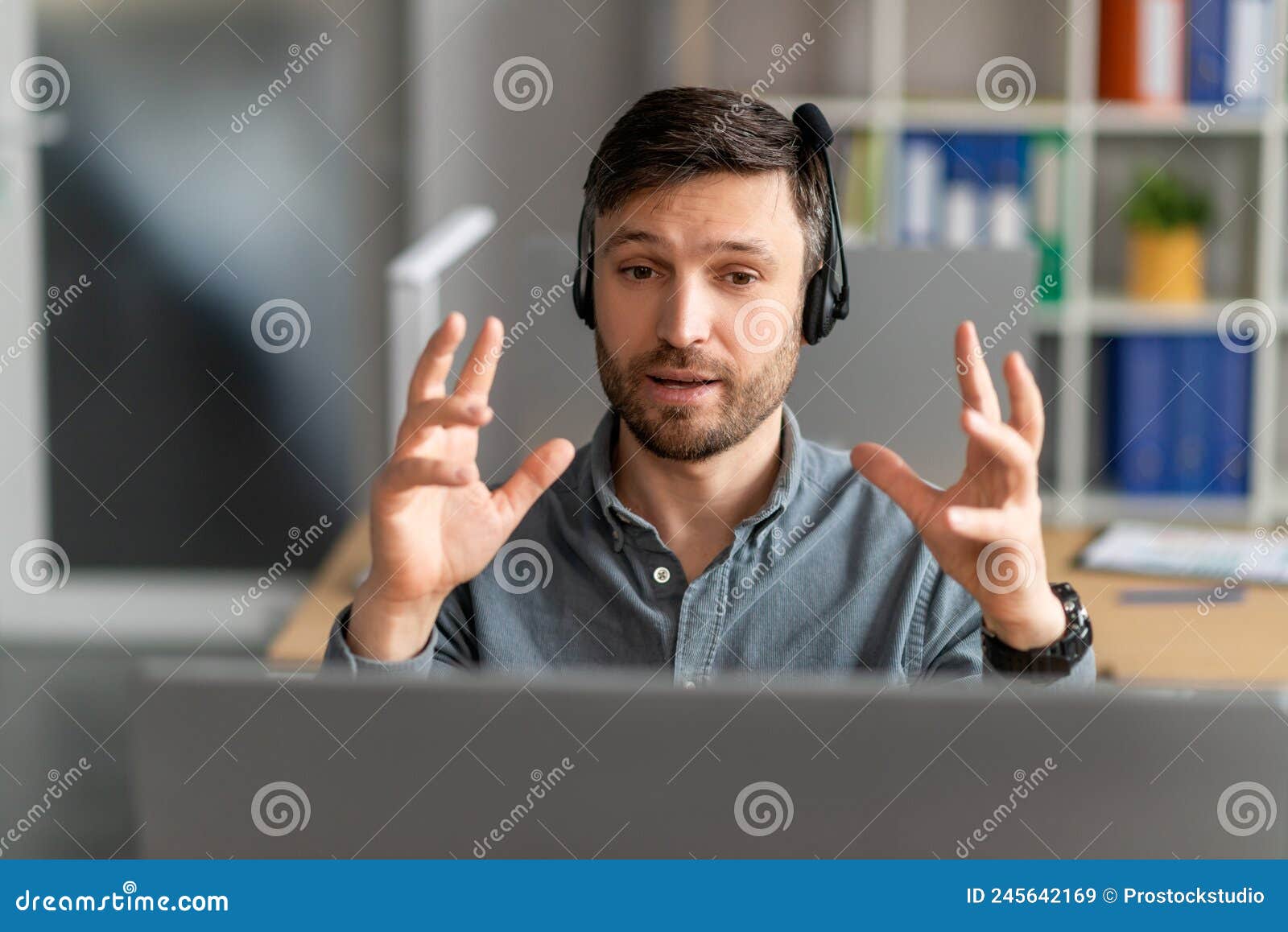 Portrait of Concentrated Male Manager in Headset Having Web Call on Pc ...