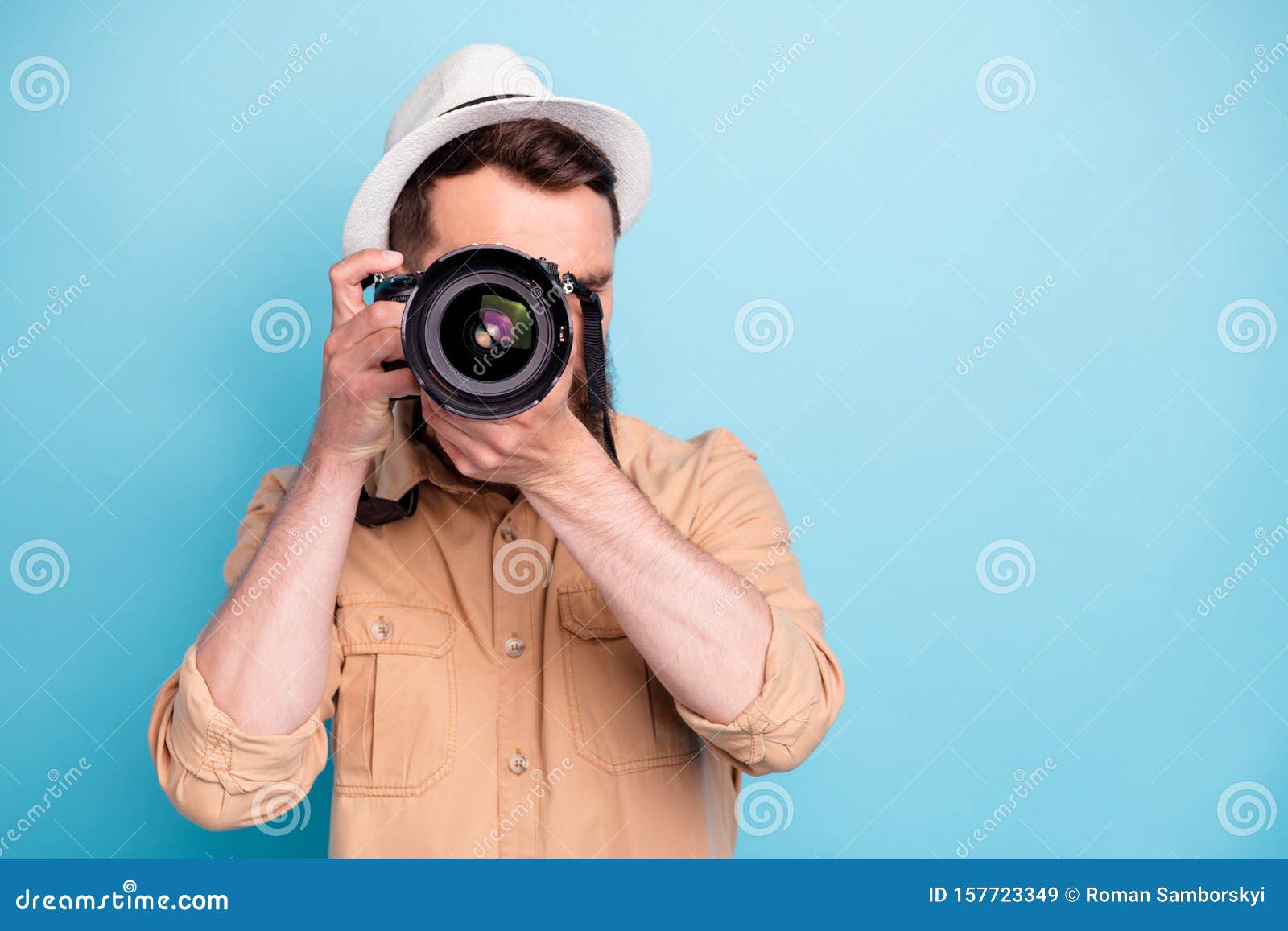 Portrait of Concentrated Person Making Photo Looking Wearing Brown ... Portrait of Concentrated Person Making Photo Looking Wearing Brown ...