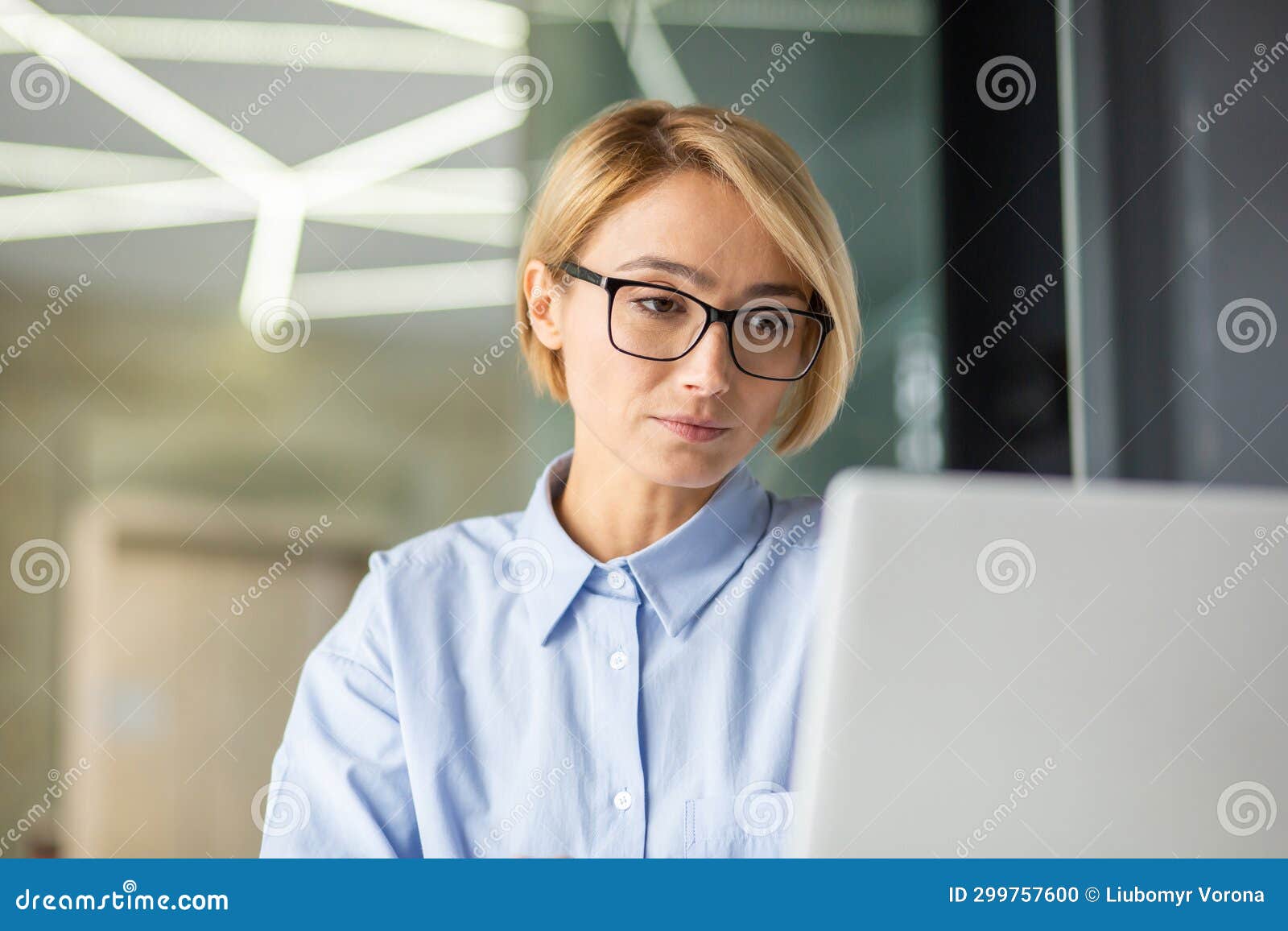 Portrait of a Concentrated Serious Well-dressed Office Worker Woman ...