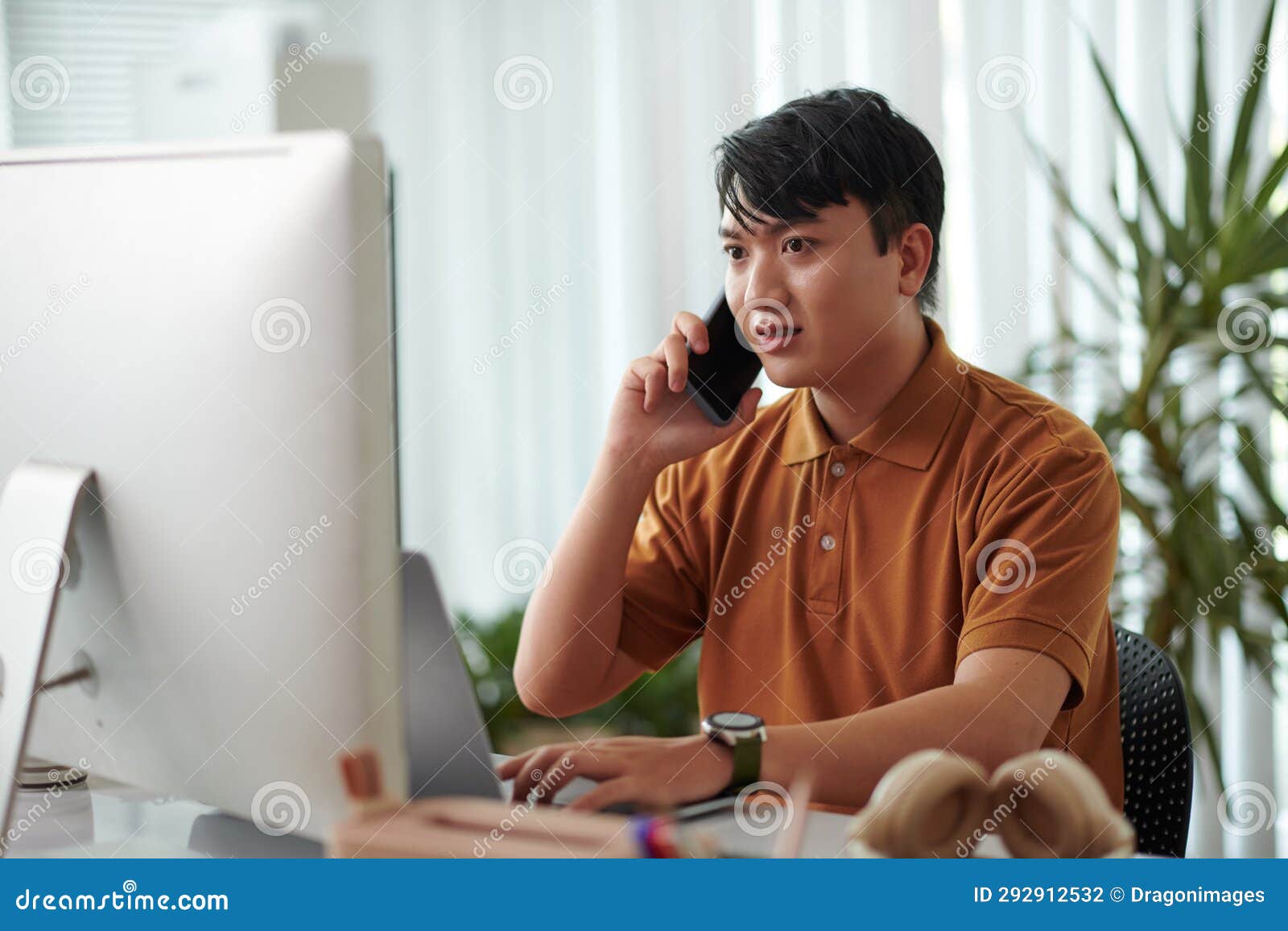 Developer Calling Coworker stock photo. Image of desk - 292912532