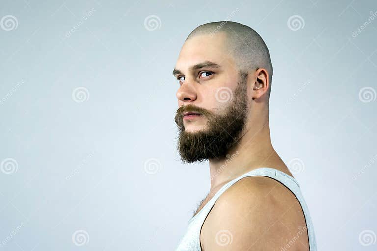 Portrait of a Confident Bald Guy with a Beard, Side View Stock Image ...