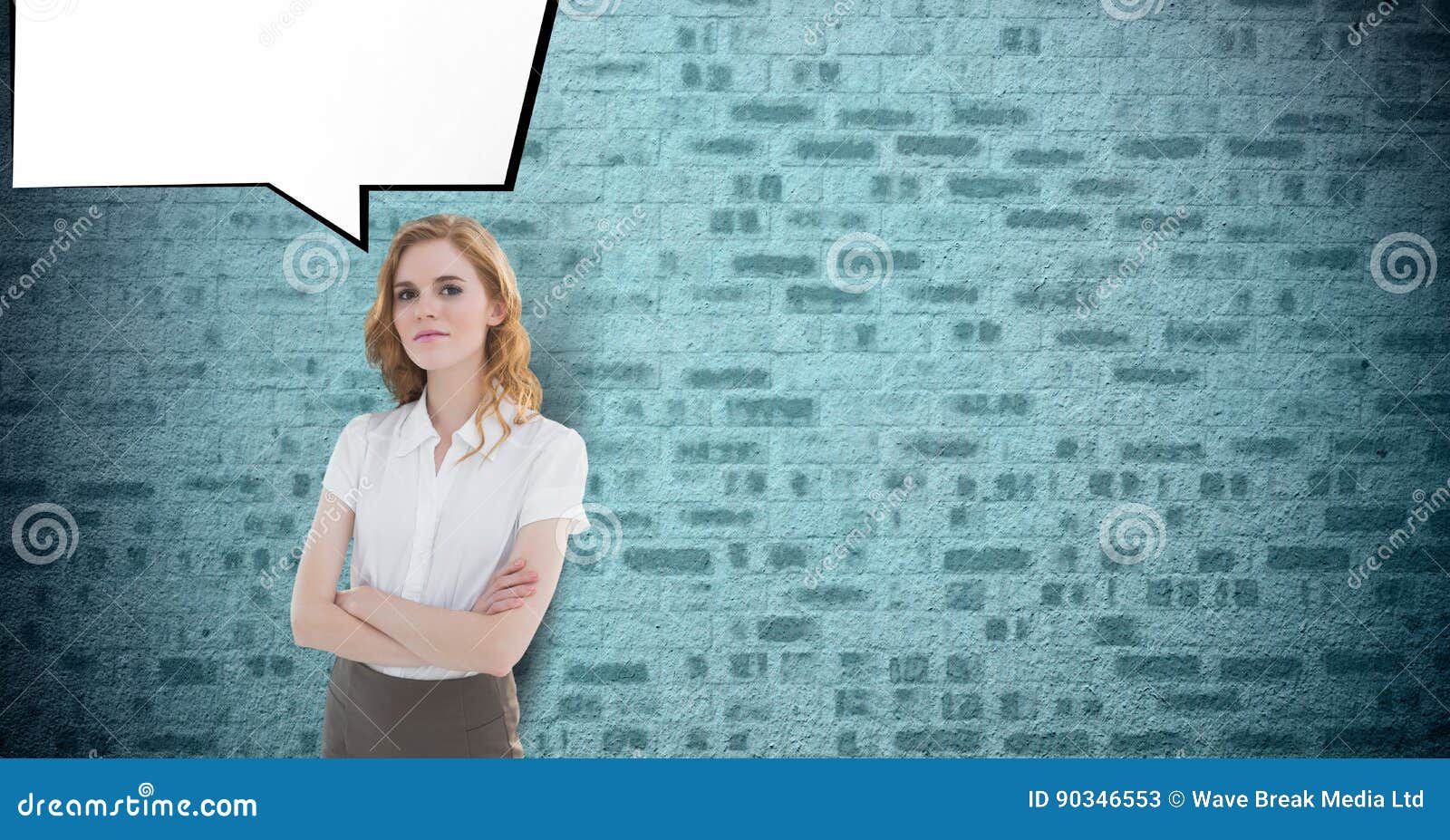 Portrait Of Confident Businesswoman Standing Arms Crossed With Speech Bubble Against Brick Wall