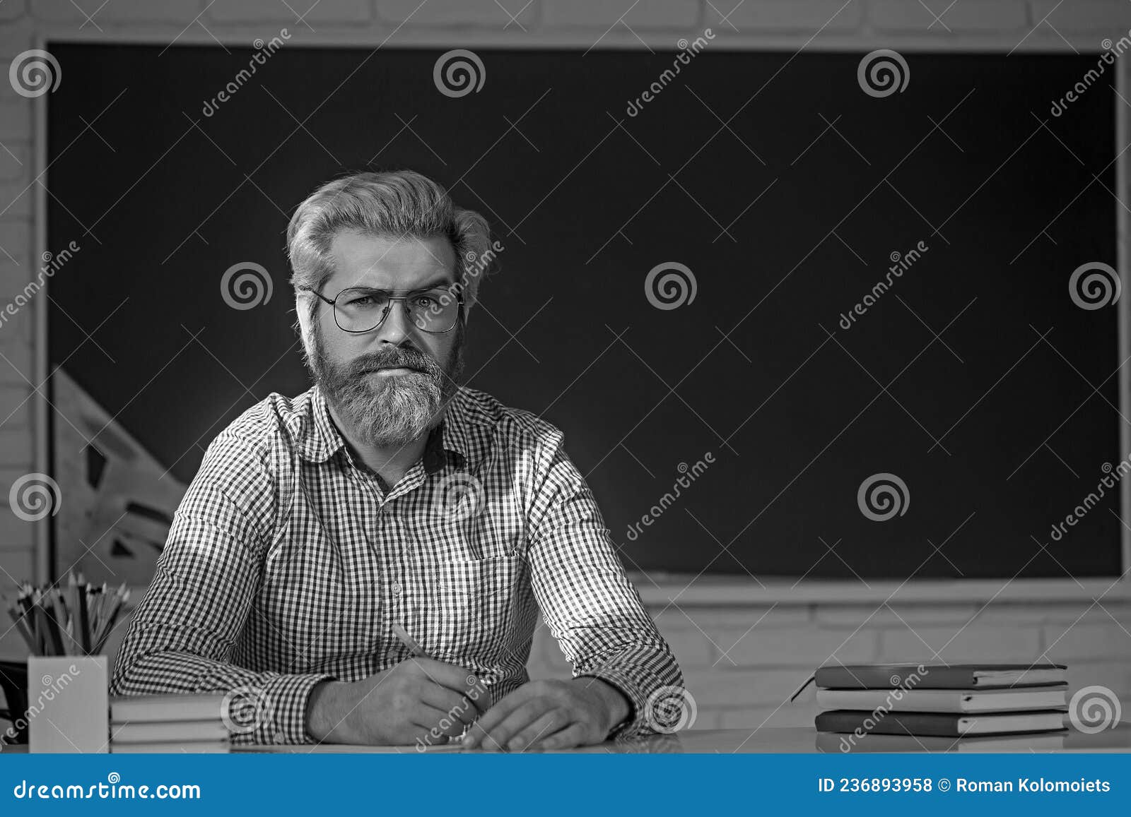 Portrait of Confident Caucasian Male Teacher in Classroom. Stock Photo ... Portrait of Confident Caucasian Male Teacher in Classroom. Stock Photo ...