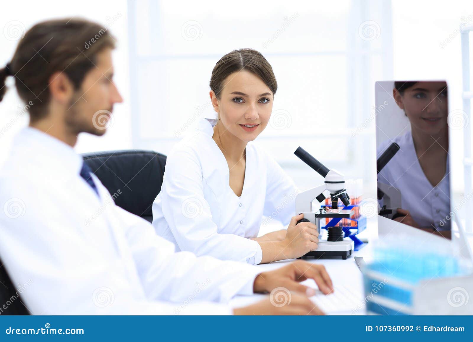 Lab Expert Working on a Test Using Microscope Stock Photo - Image of ...