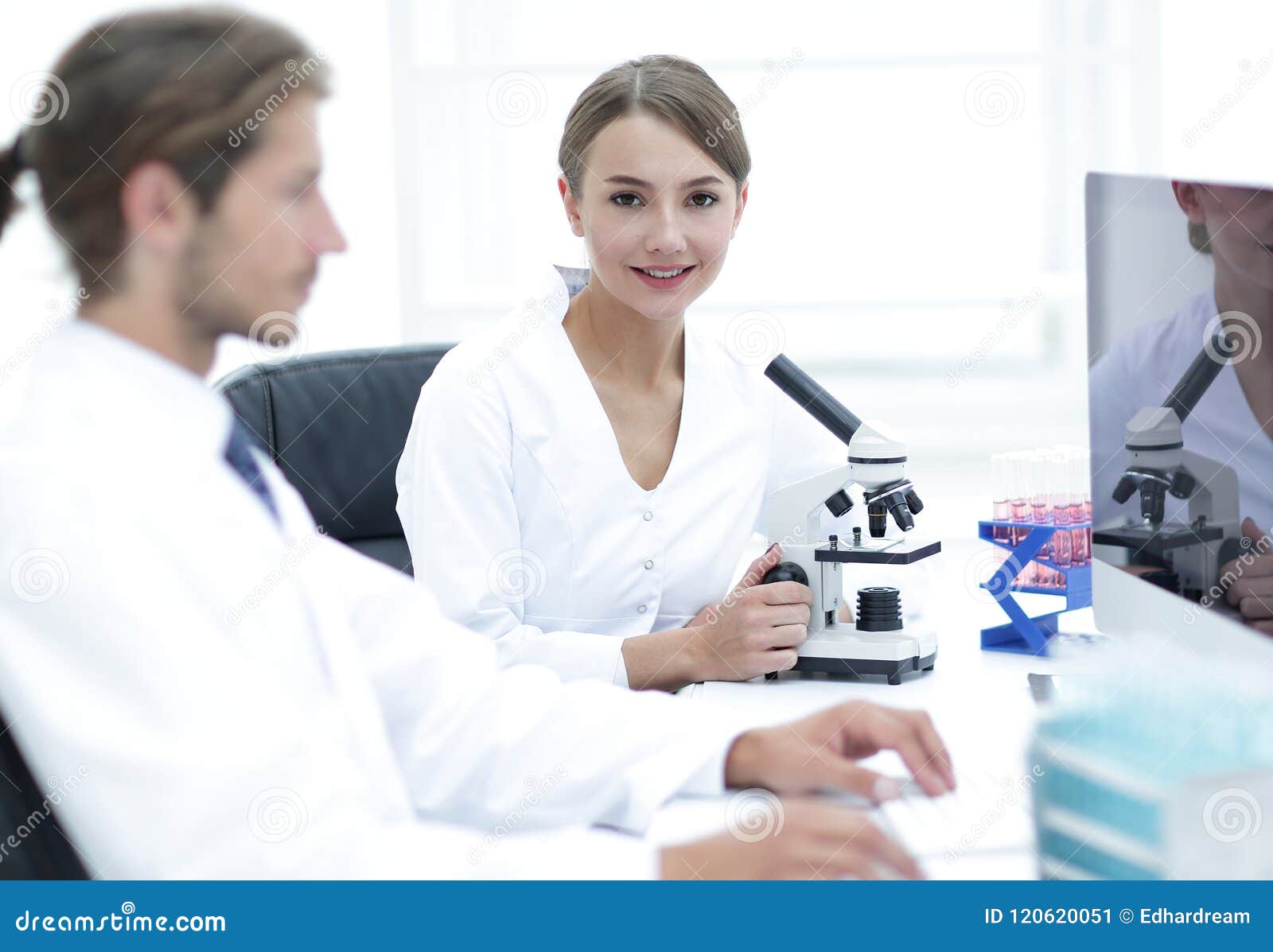 Lab Expert Working on a Test Using Microscope Stock Image - Image of ...