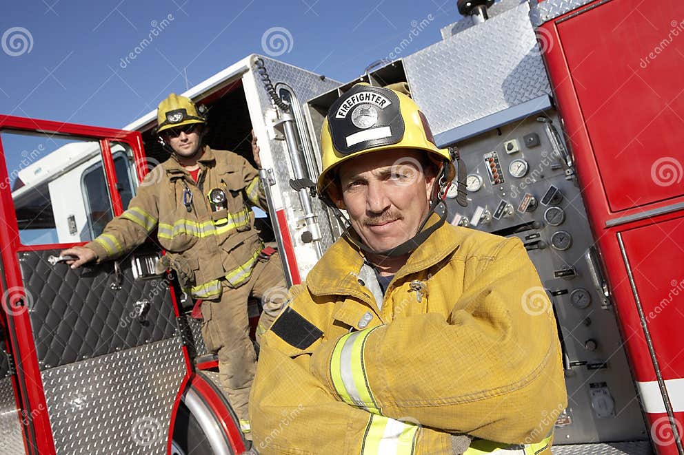 Portrait of a Confident Firefighter Stock Photo - Image of middle ...