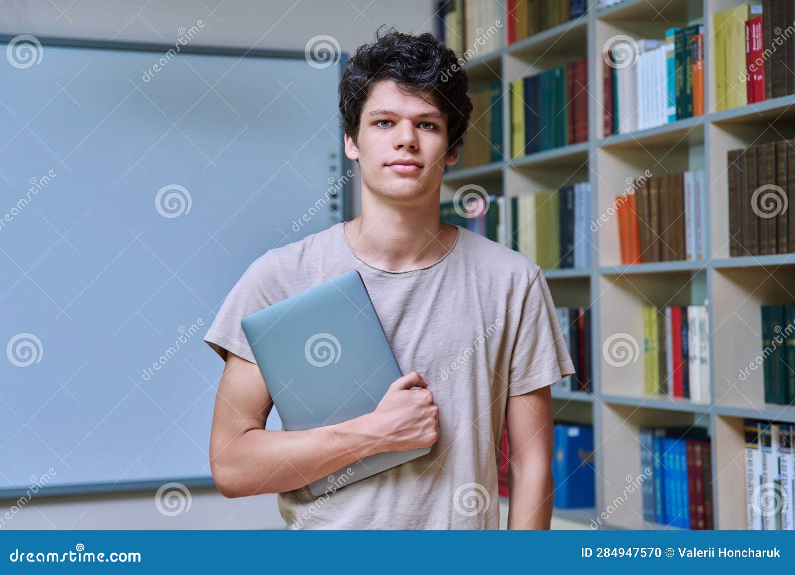 Portrait of Confident Guy College Student Looking at Camera Inside ...