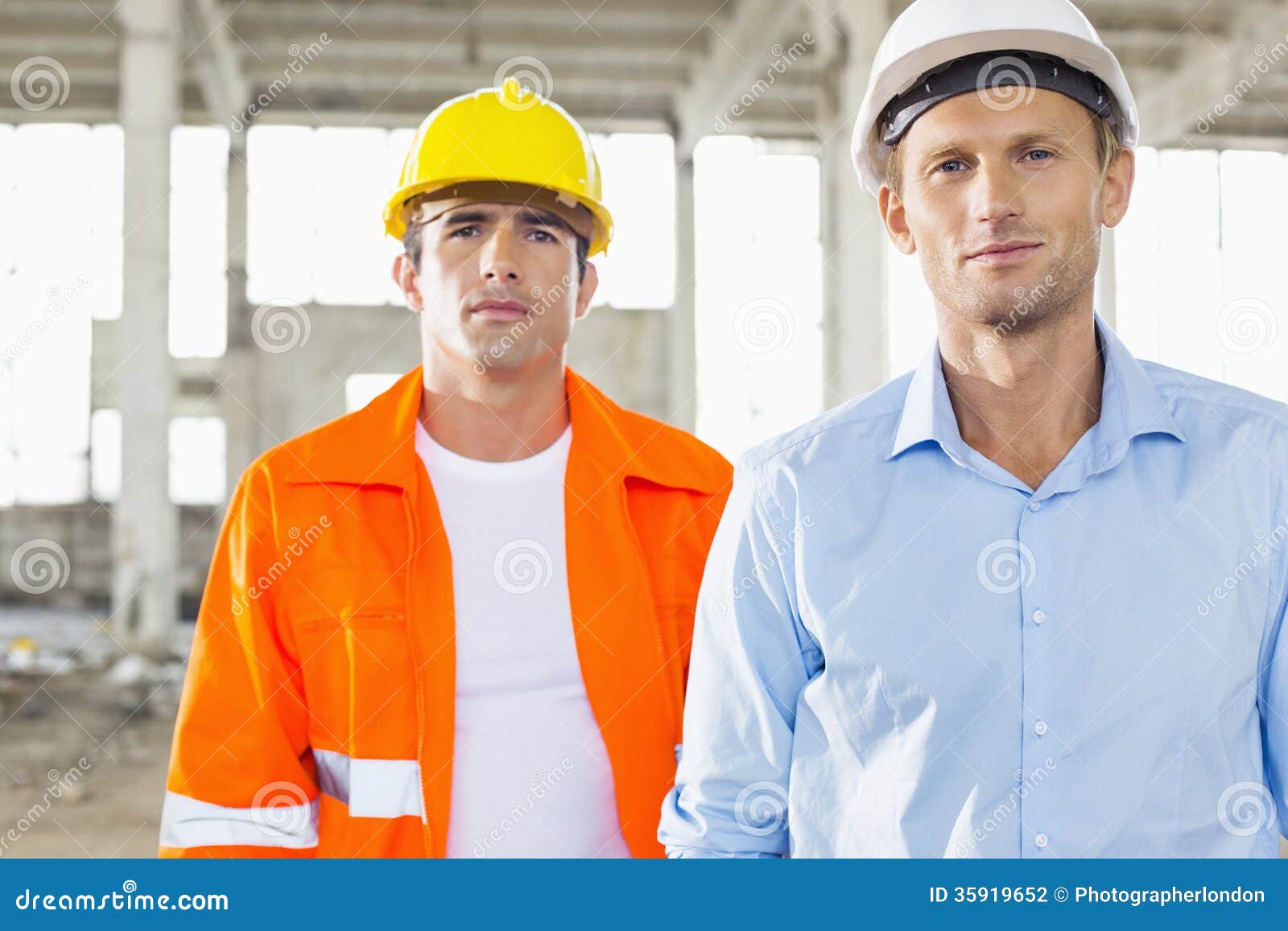 Portrait of Confident Male Architects at Construction Site Stock Photo ...