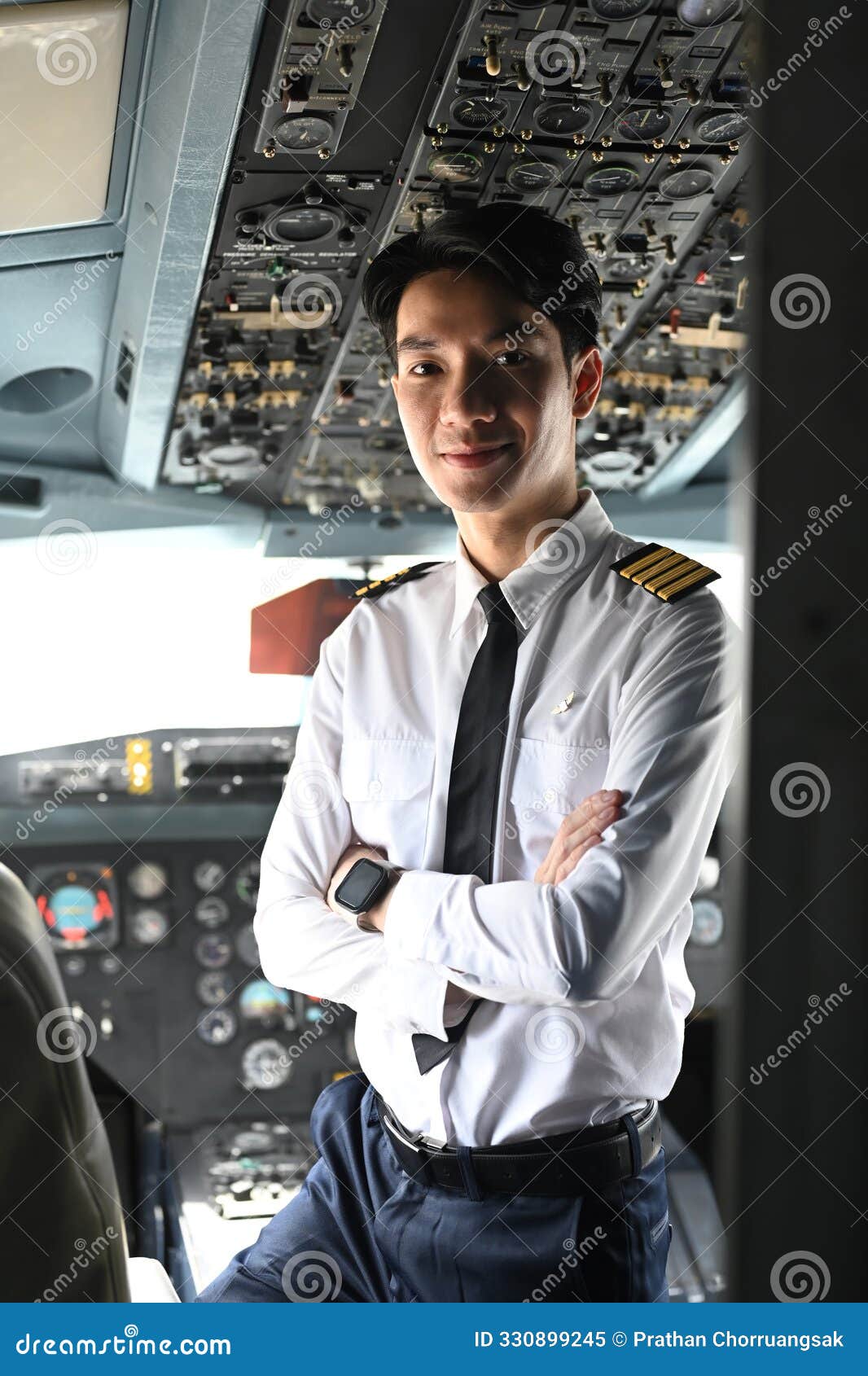 Portrait of Confident Pilot is Smiling and Posing in the Cockpit of an ...