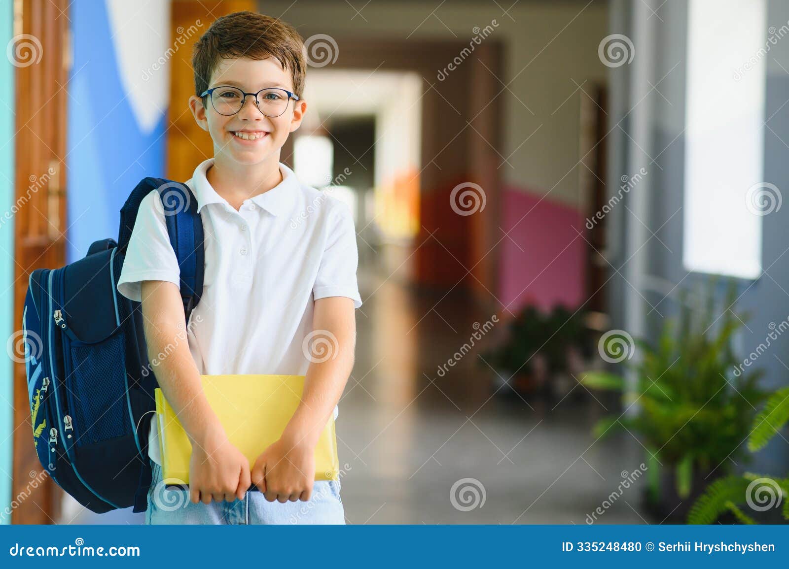 Portrait Confident Schoolboy in School Corridor Stock Photo - Image of ...